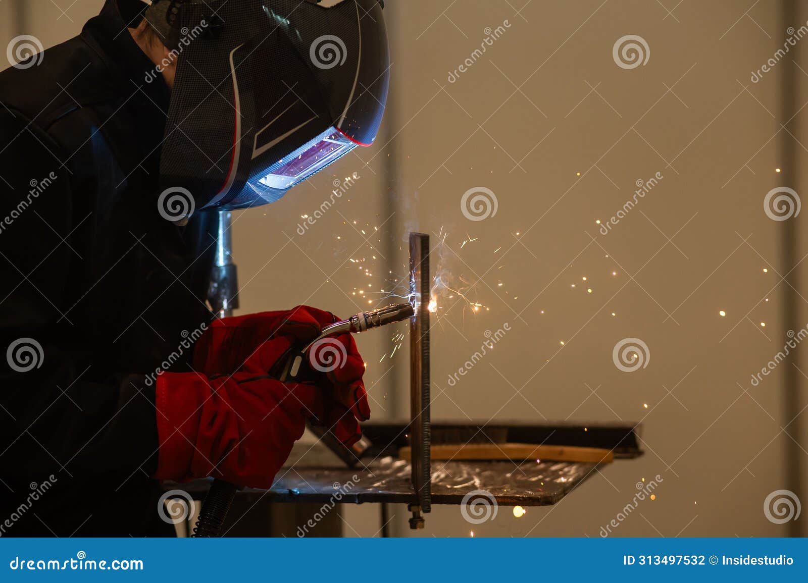 A Man Learns the Craft of Welding on a Sample. Stock Photo - Image of ...