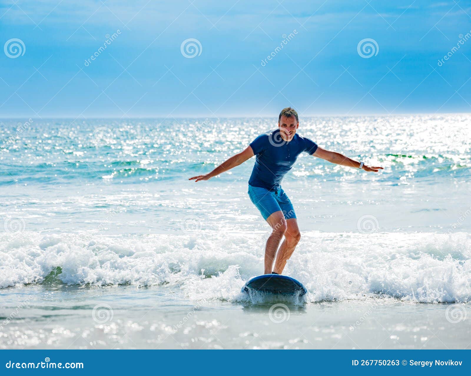 Man Learns To Surf Waves Balancing on Surfboard Stock Image - Image of ...