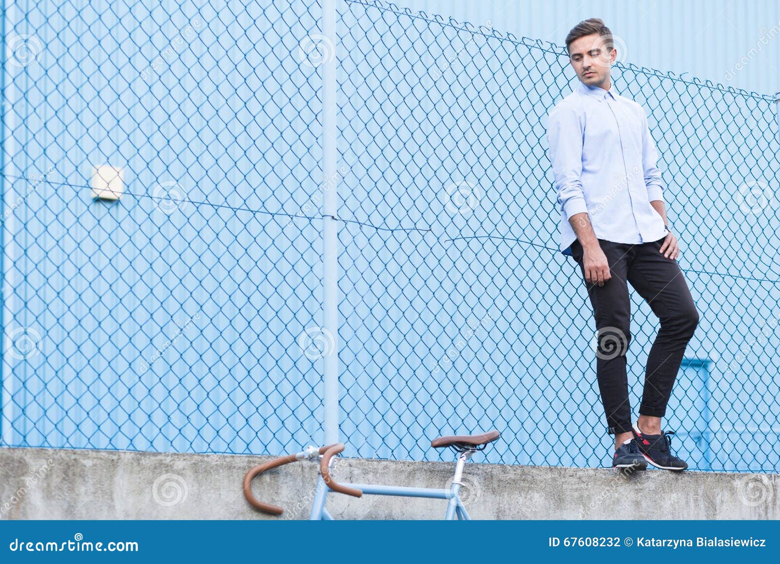 Man on ledge stock photo. Image of lifestyle, person - 67608232