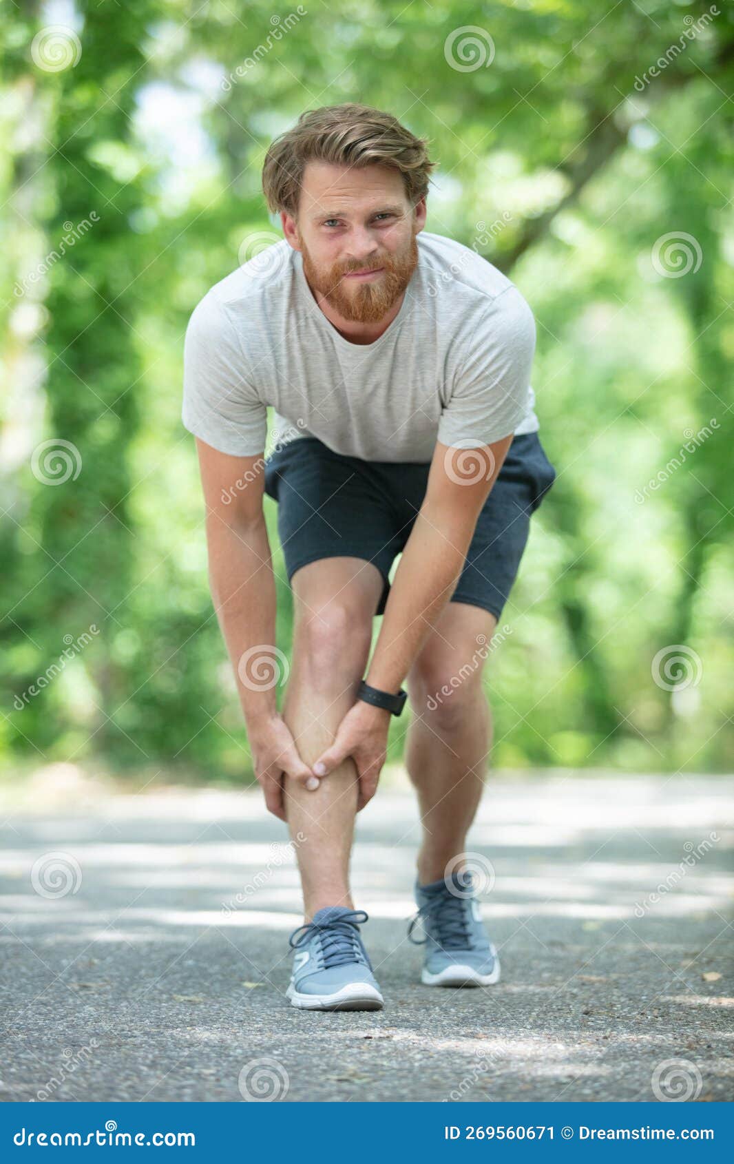 Man with Leg Injury in Park Stock Image - Image of coat, romance: 269560671