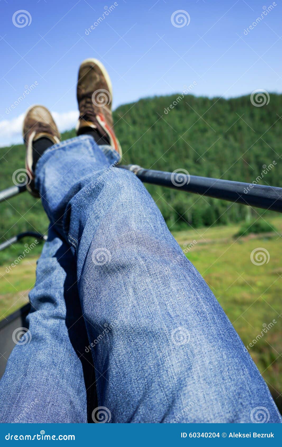 Man, legs crossed stock photo. Image of human, rest, lying - 60340204