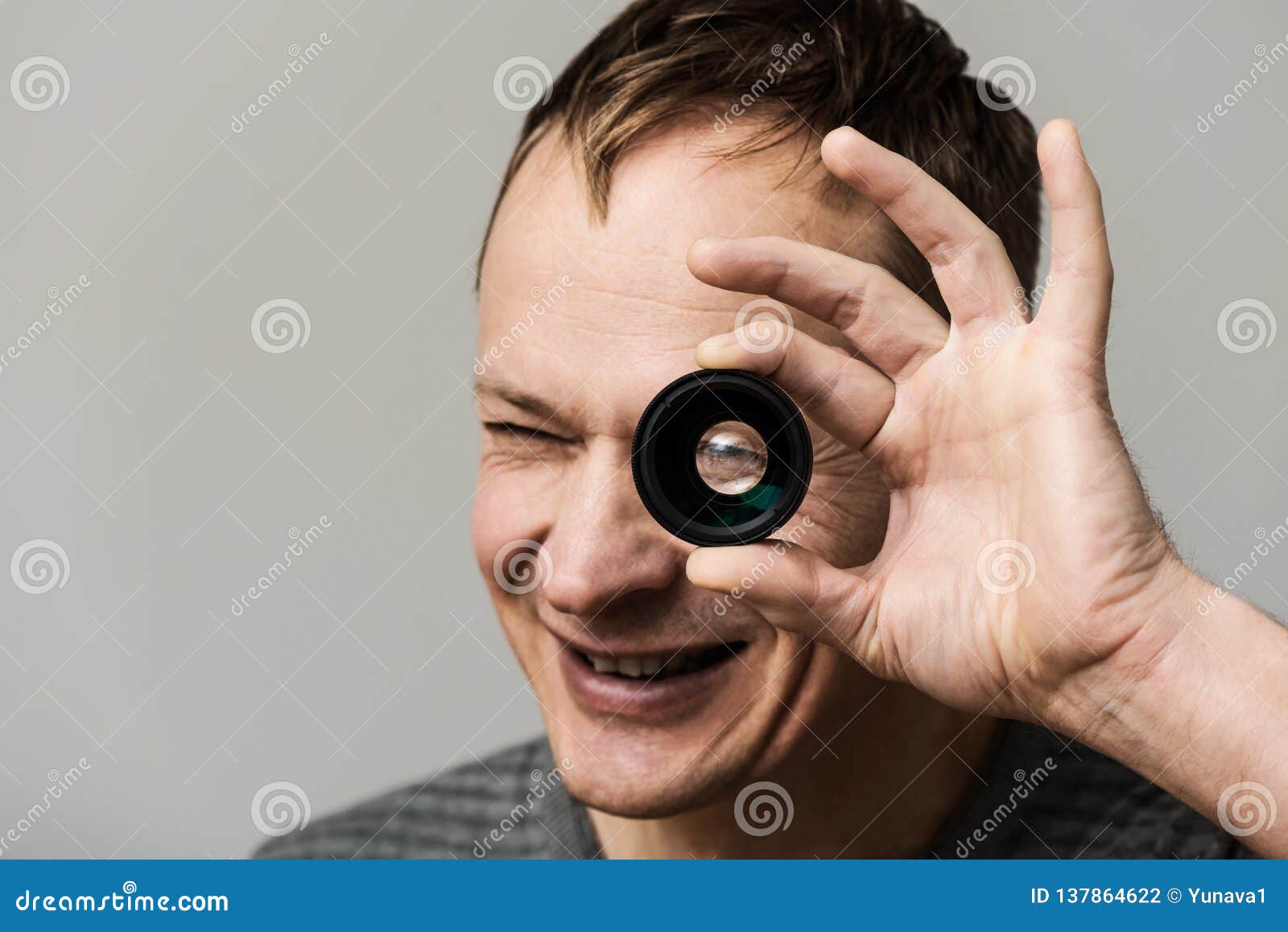 The man with a lens stock photo. Image of photographer - 137864622