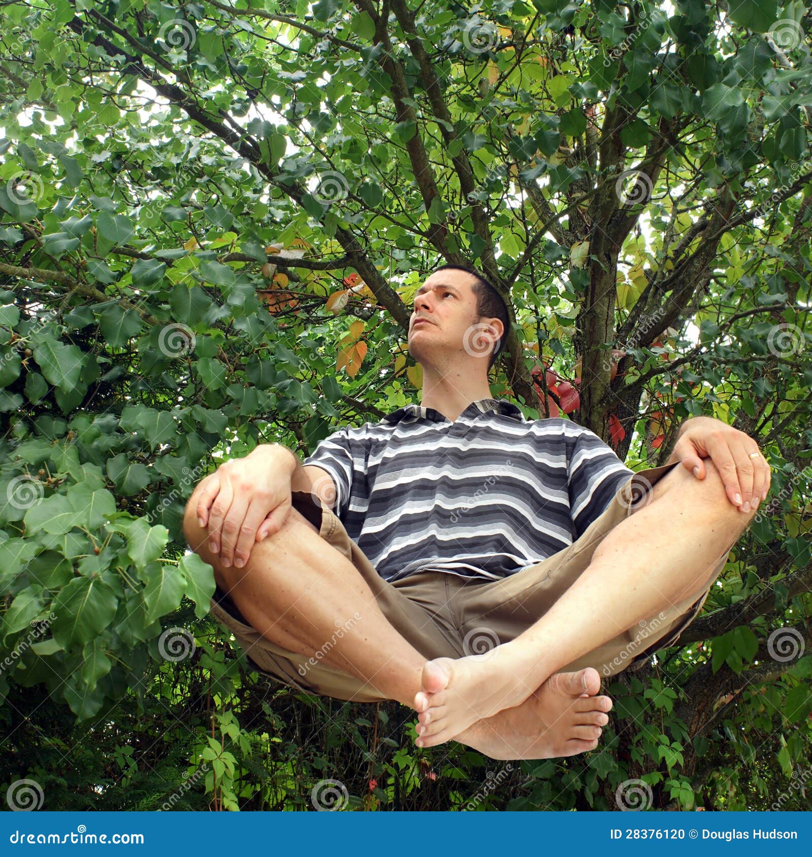Man levitating in garden stock photo. Image of confidence - 28376120