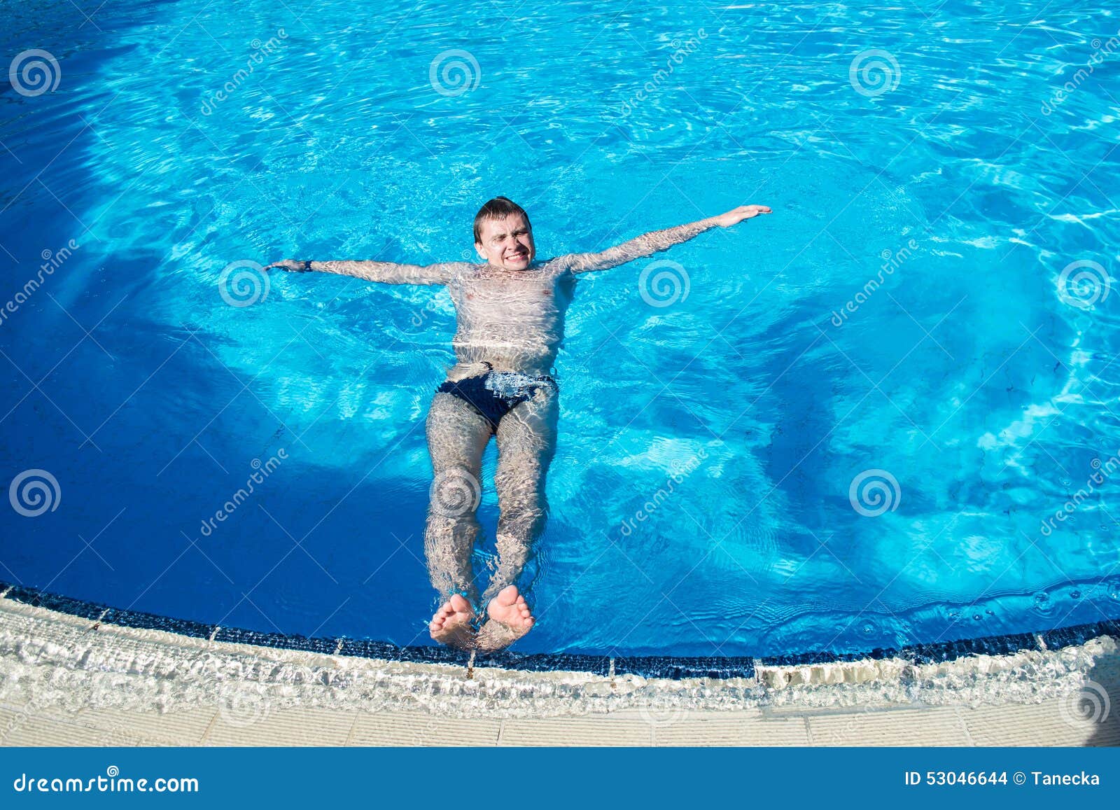 Man Lie on Surface of Water in the Swimming Pool Stock Photo - Image of ...