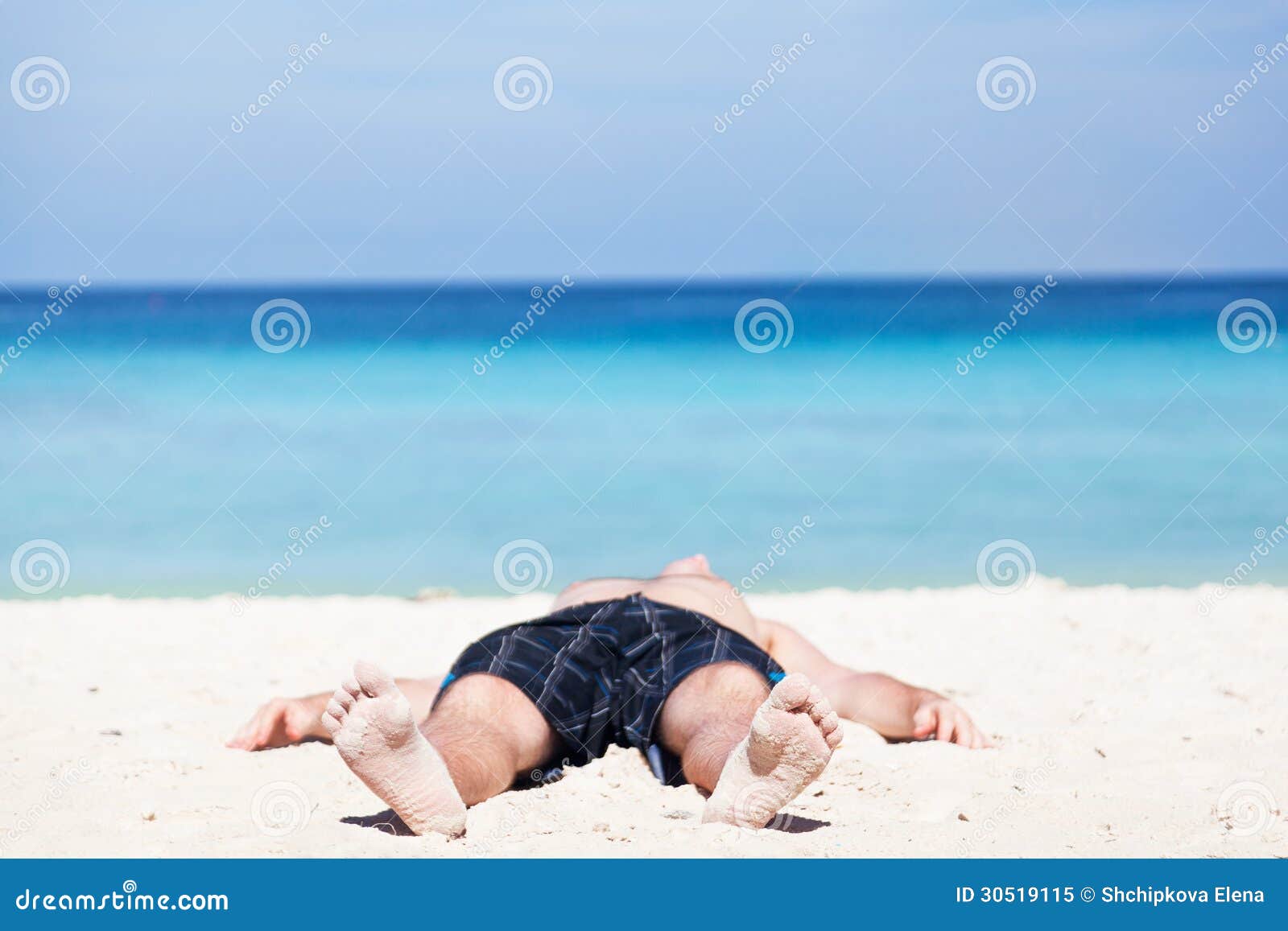 Man lies on a beach stock image. Image of light, open - 30519115