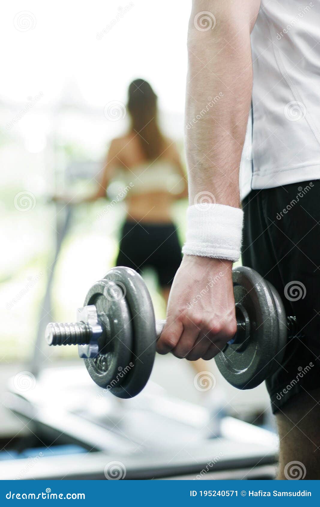 Man lifting a dumbbell stock image. Image of lifting - 195240571