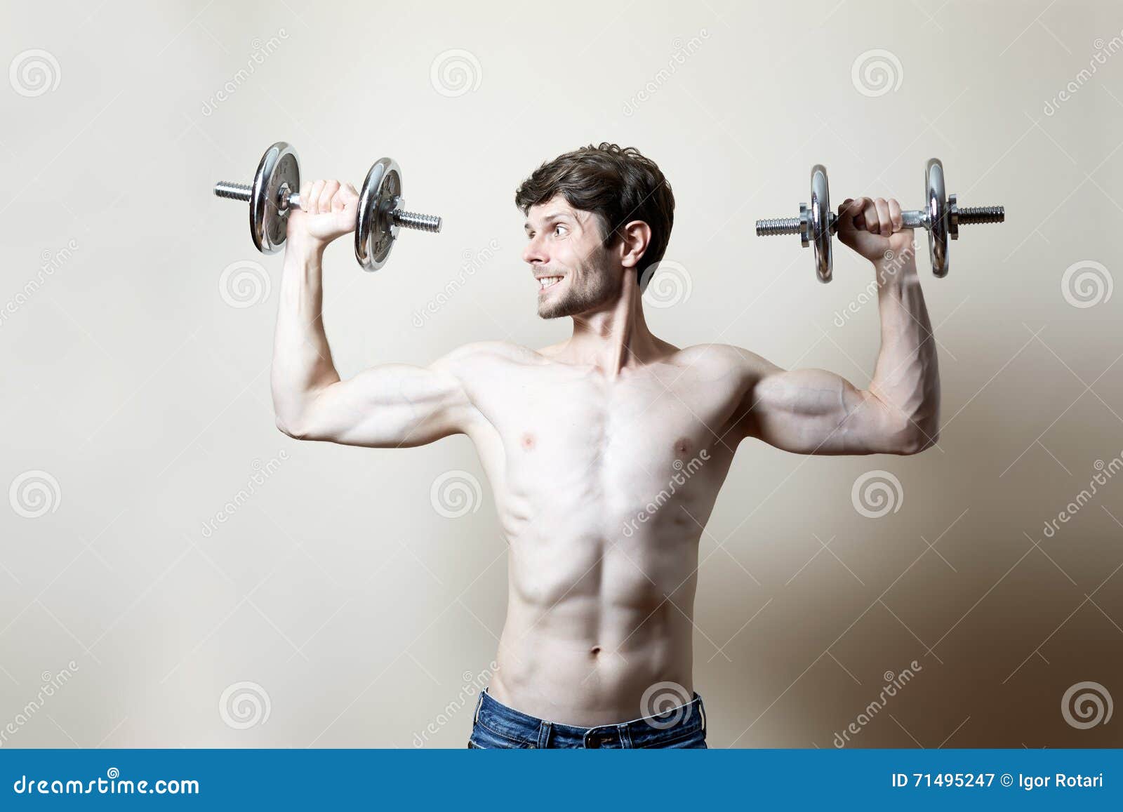 Man lifting dumbbell stock image. Image of effort, muscular - 71495247