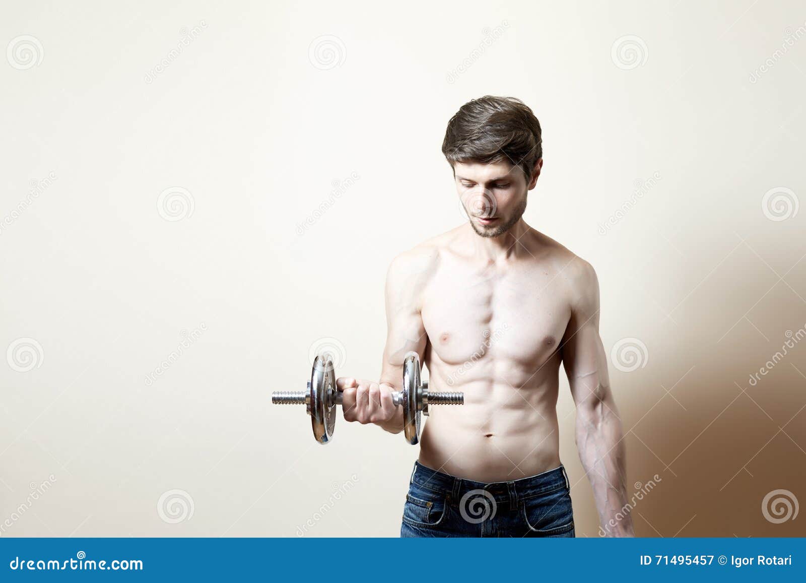 Man lifting dumbbell stock image. Image of sports, abdomen - 71495457