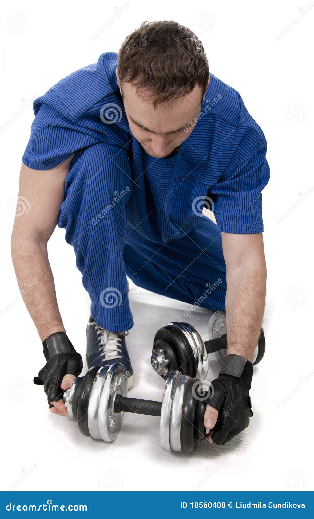Man lifting dumbbells. stock photo. Image of holding - 18560408