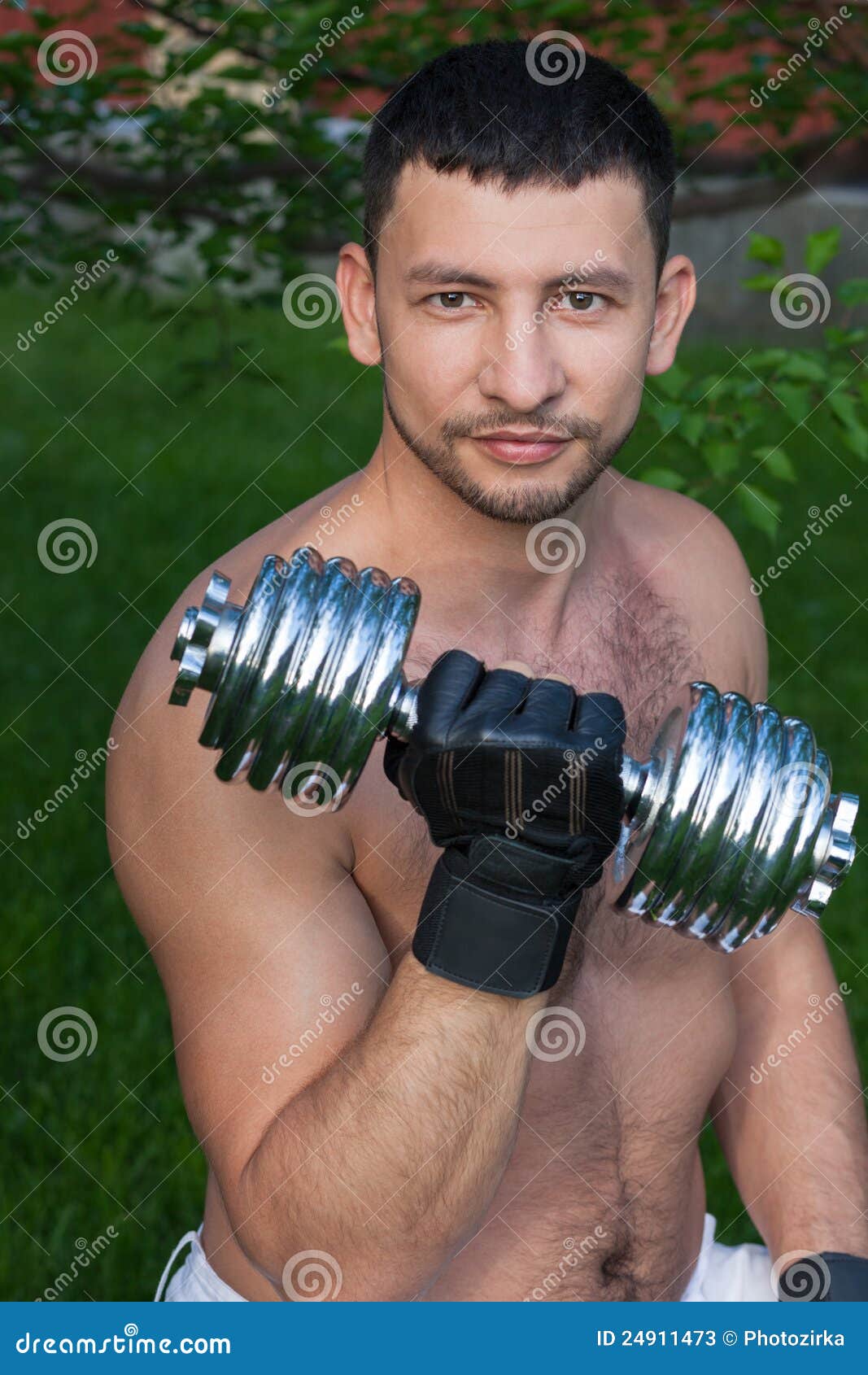 Man Lifting Free Weights Outside Stock Image - Image of dumbbell, build ...