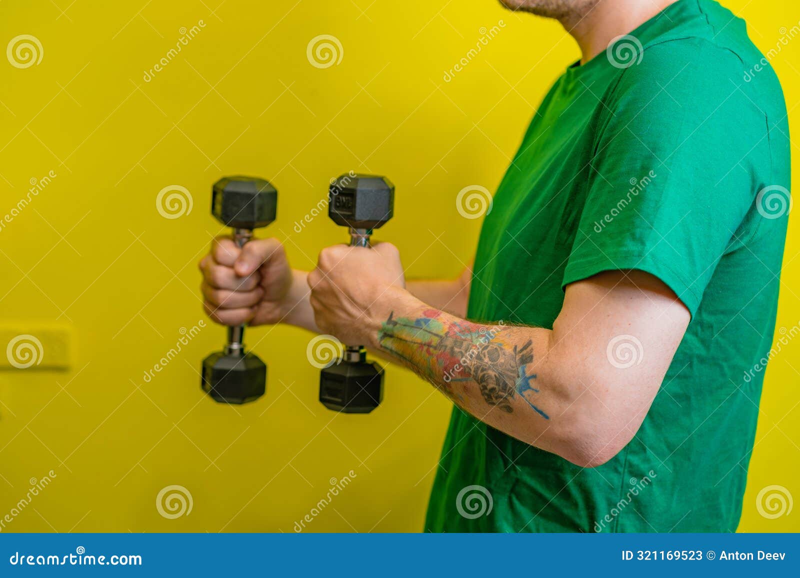 Man Lifting Green Dumbbells during Home Workout Stock Image - Image of ...