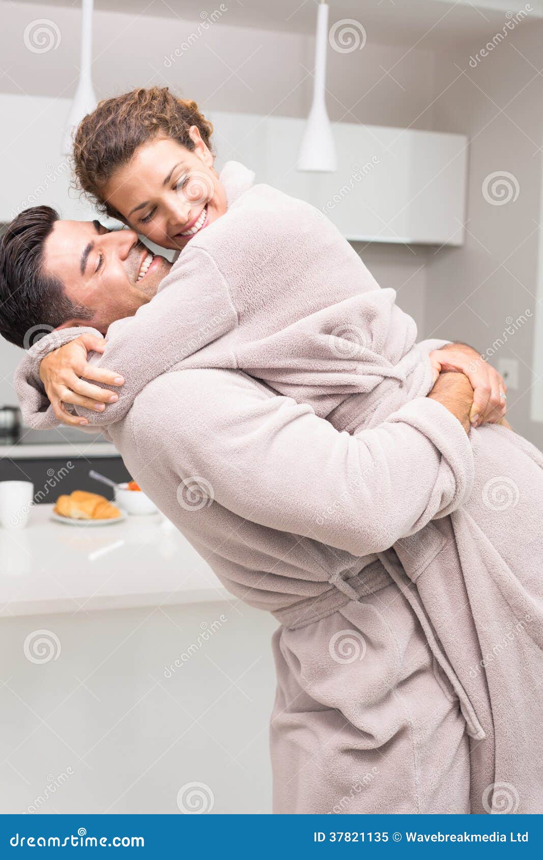 Man Lifting and Hugging His Partner in the Morning Stock Image - Image ...