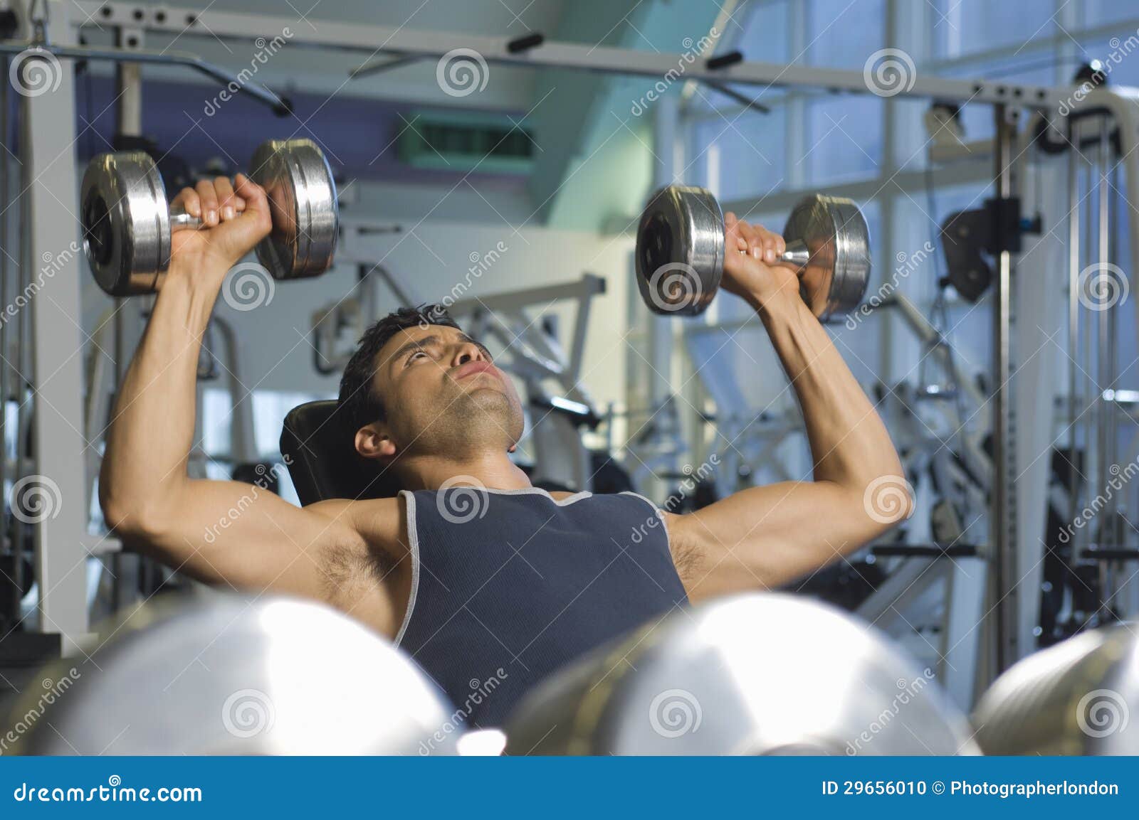 Man Lifting Weights stock photo. Image of bodybuilding - 29656010