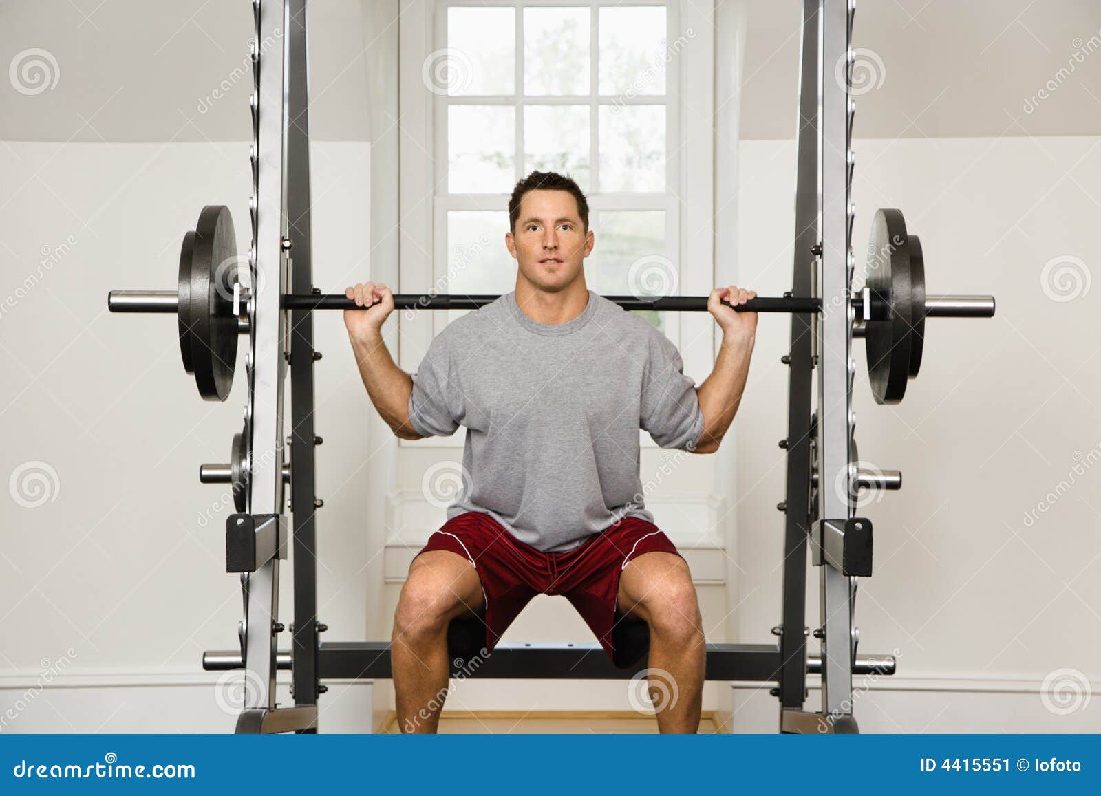 Man lifting weights stock image. Image of physical, club - 4415551
