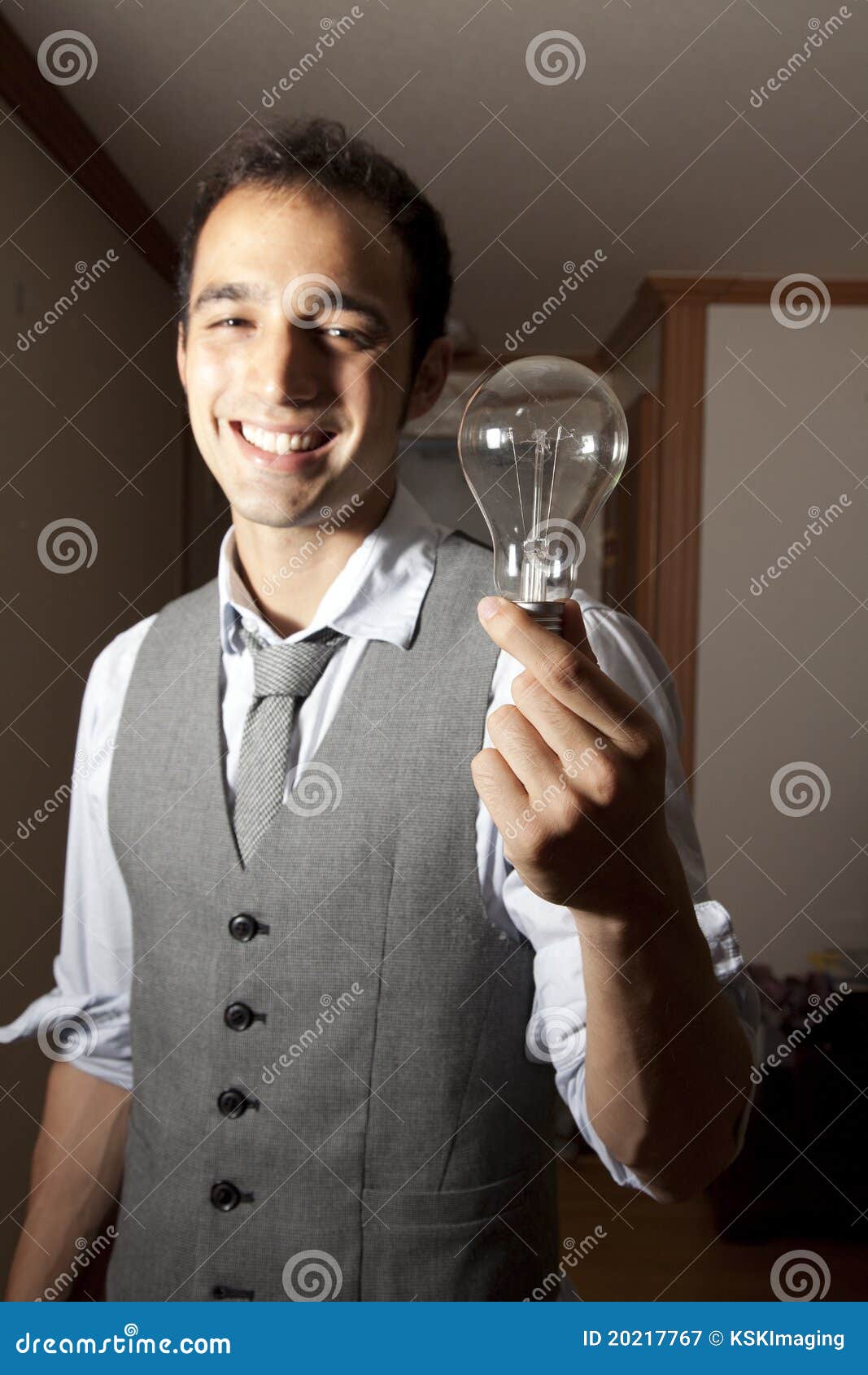 Man with a light bulb stock image. Image of planning - 20217767