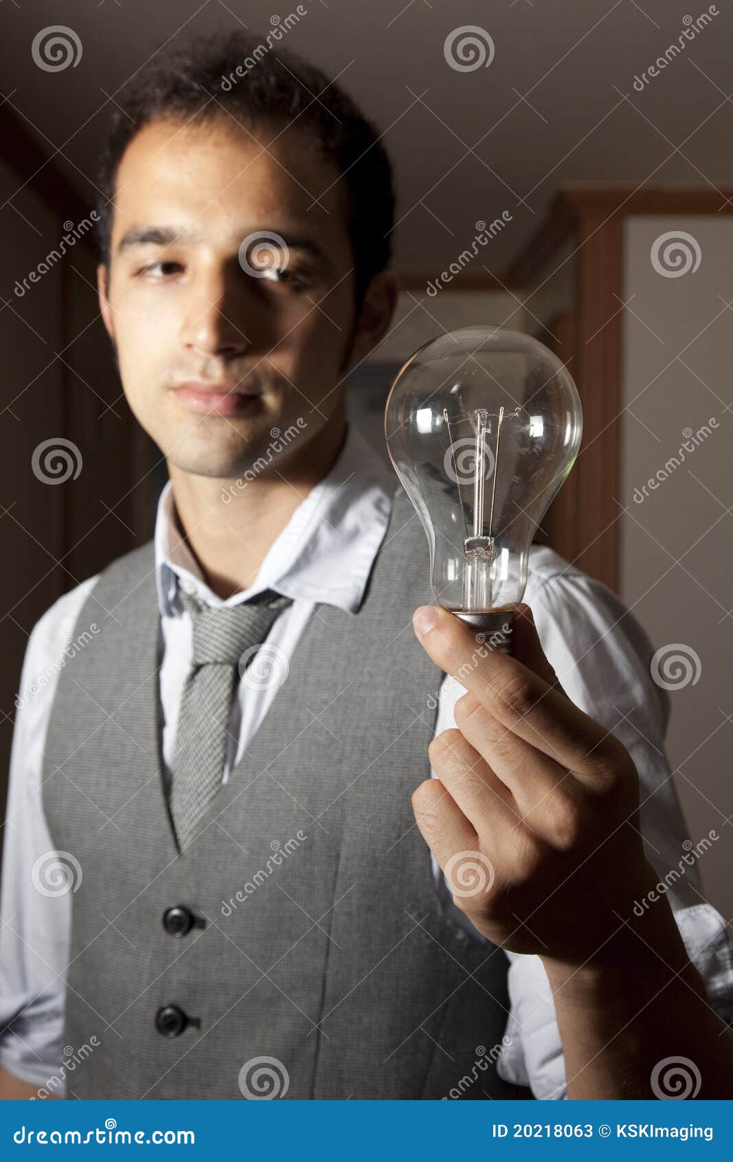 Man with a light bulb stock image. Image of equipment - 20218063