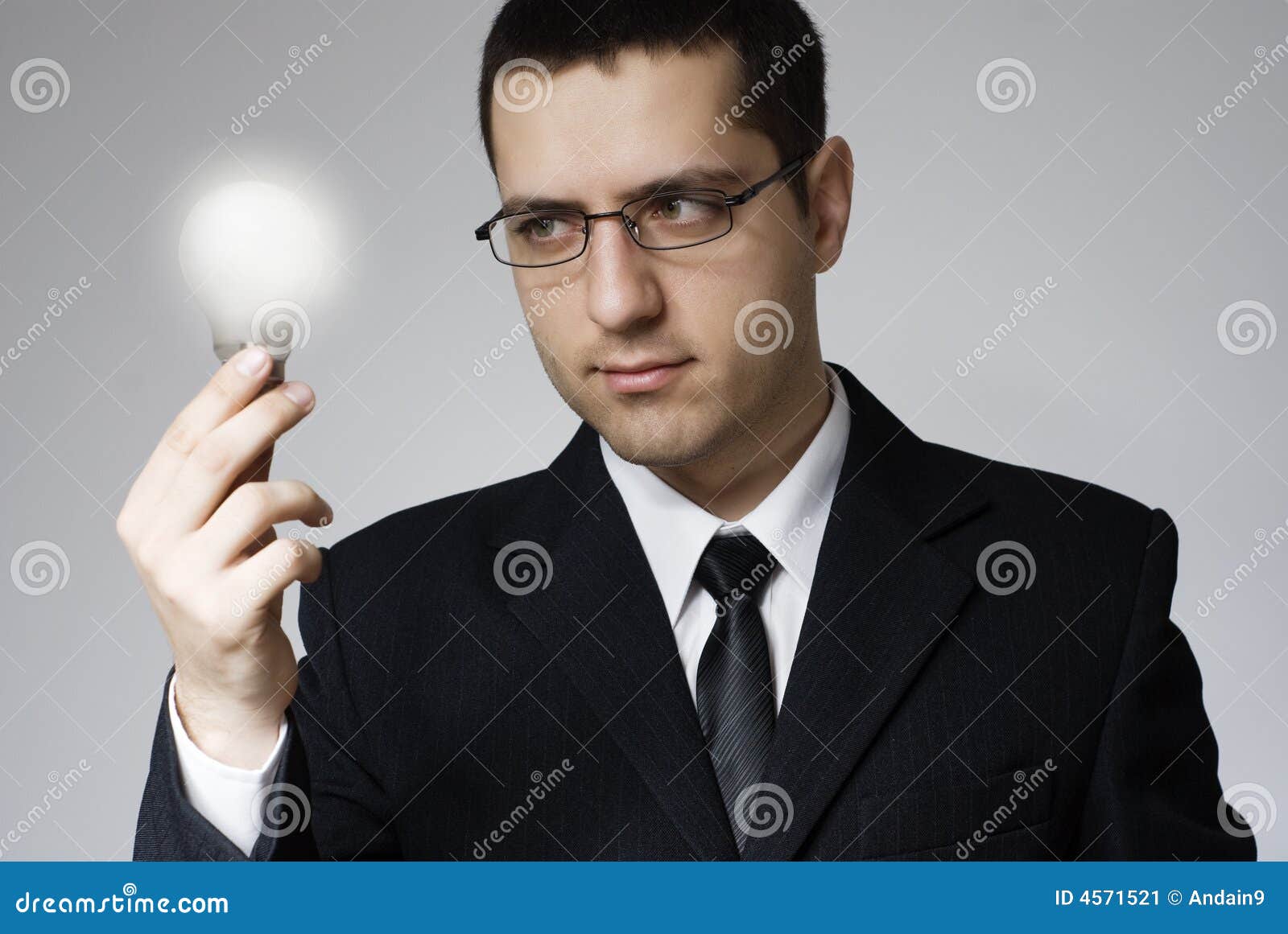 Man with light bulb stock image. Image of male, innovative - 4571521