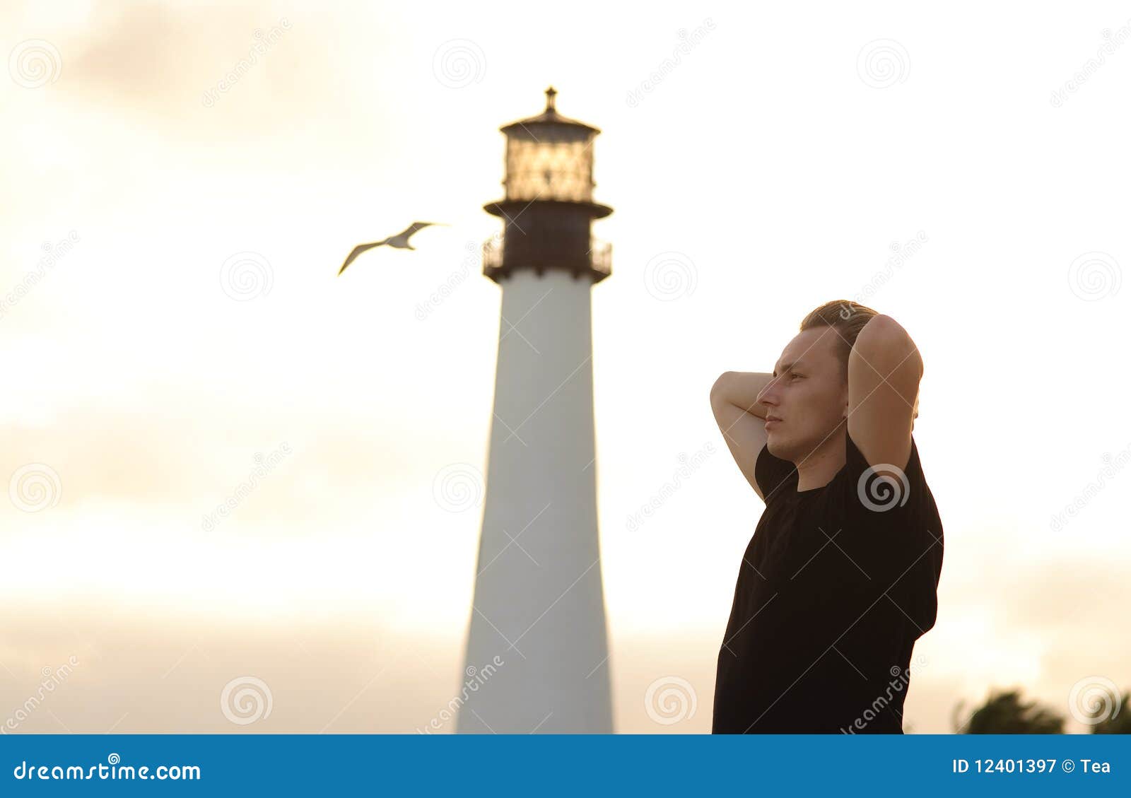 Man and lighthouse stock image. Image of landscape, lighthouse - 12401397