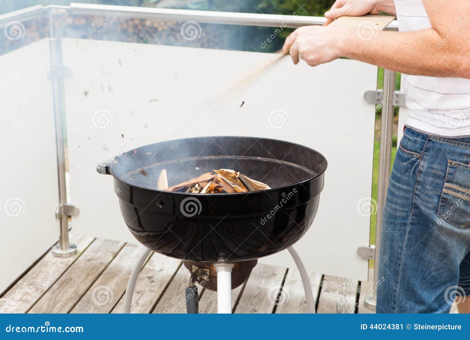 Man is Lighting the Fire for Bbq Stock Image - Image of roof, griller ...