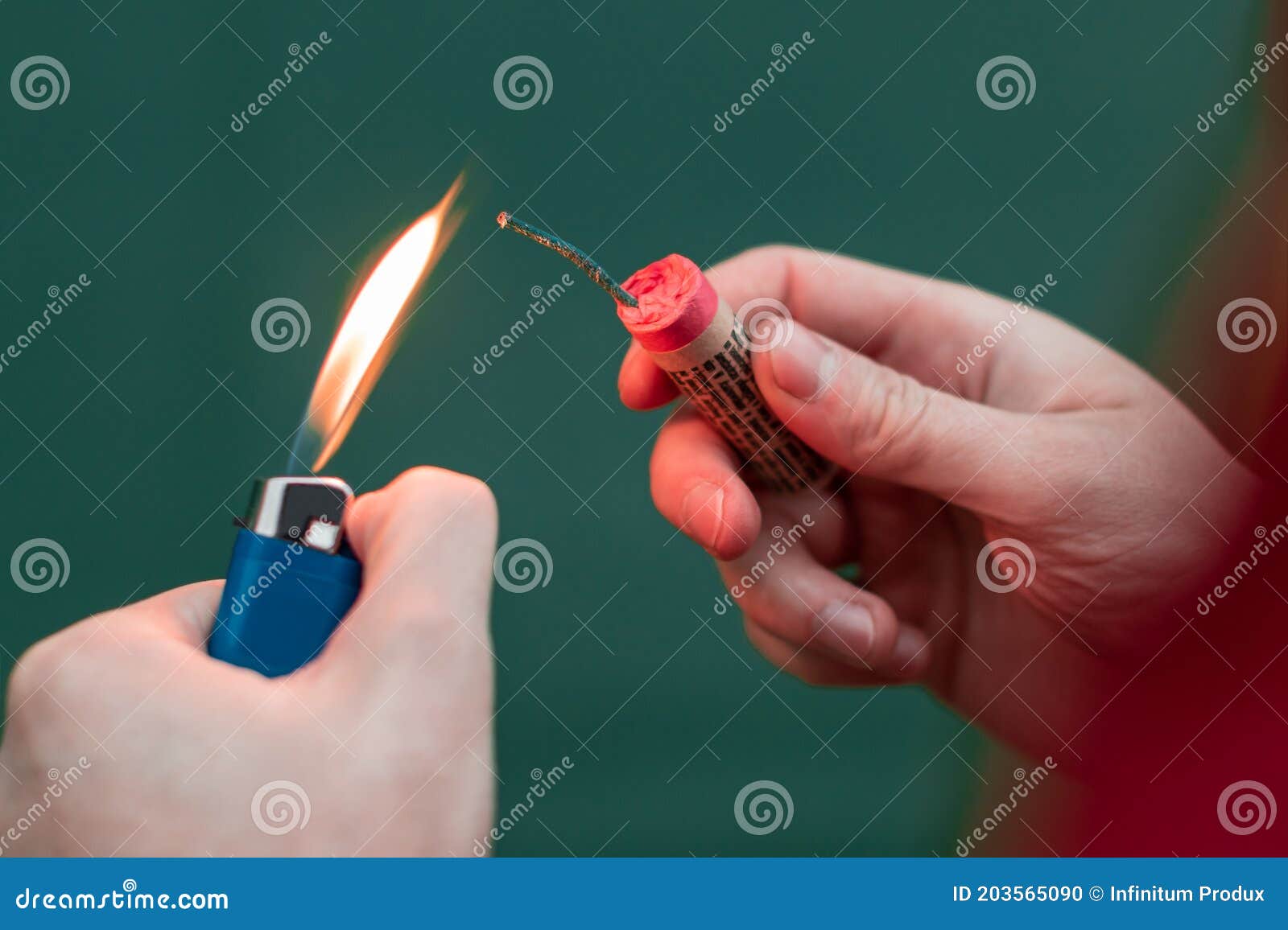 Man Lighting Up Firecracker in His Hand Stock Photo - Image of petard ...