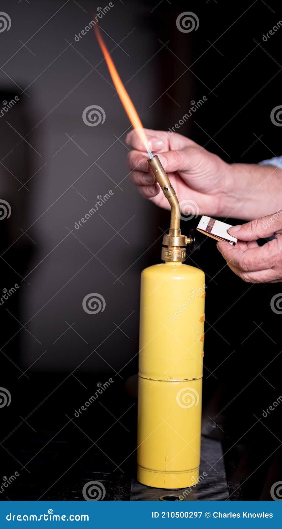 Man Lights Up a Propane Torch with a Match Stock Image - Image of fire ...