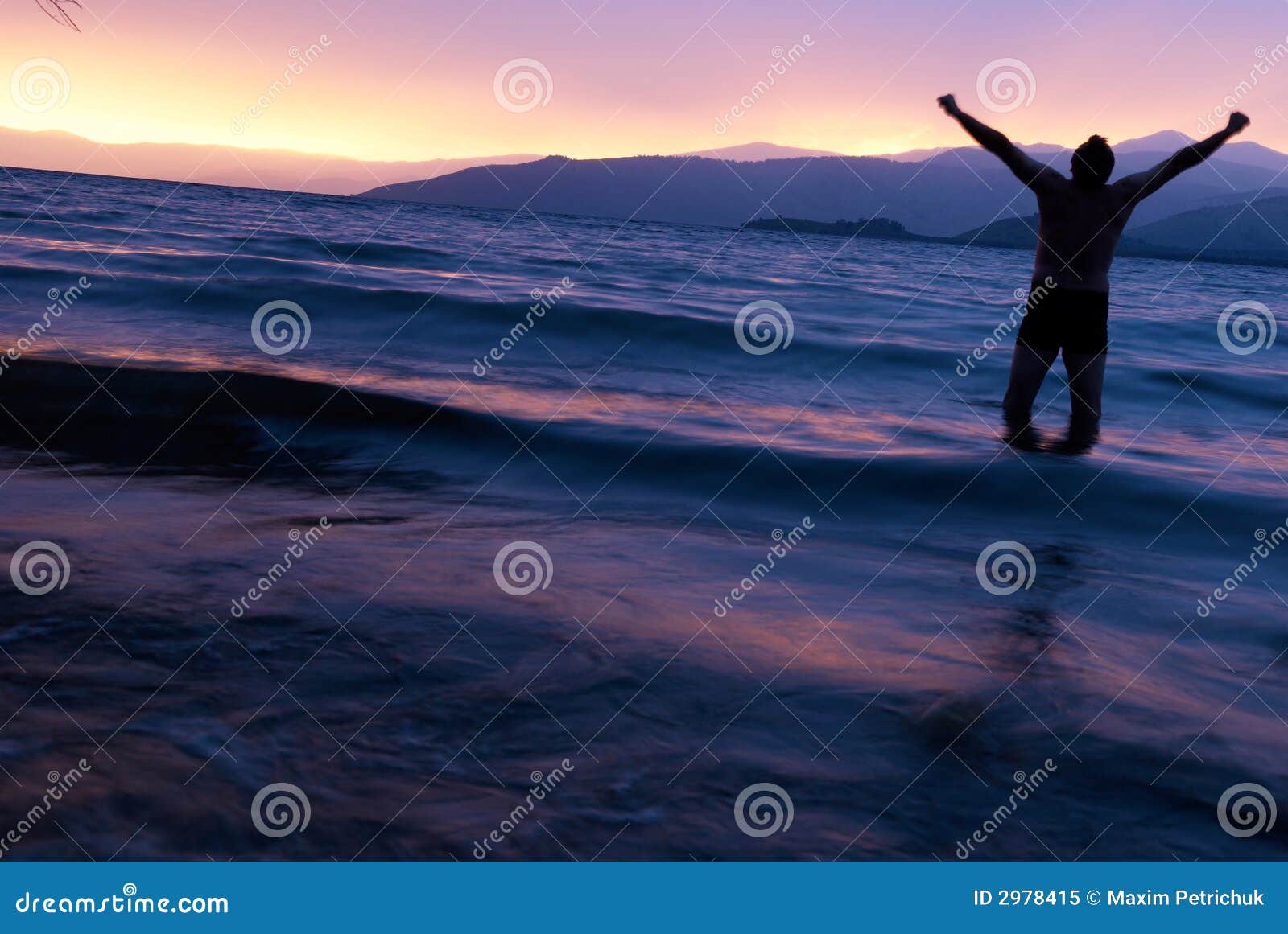 Man on the like at sunset stock image. Image of ecstatic - 2978415