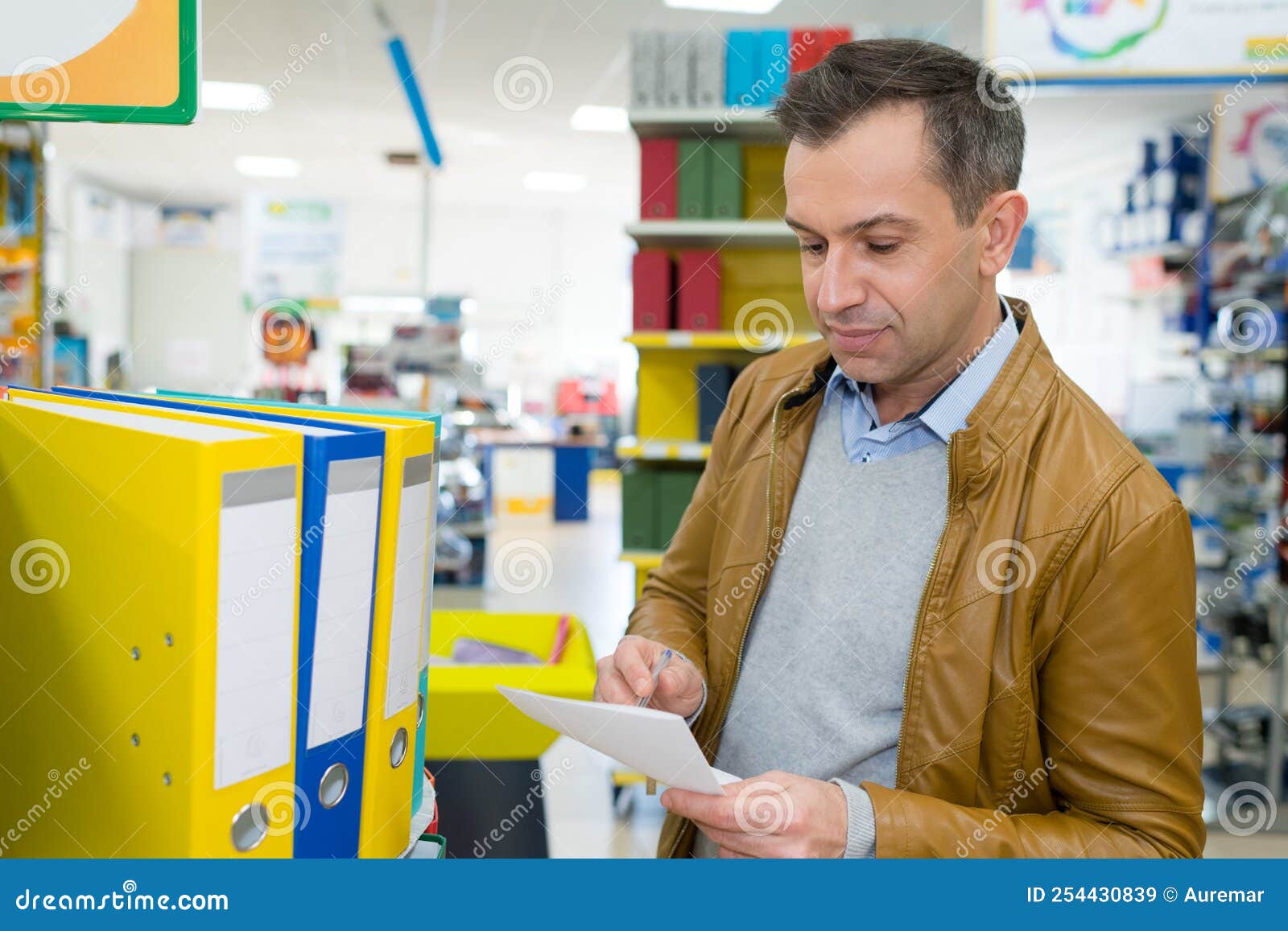 Man with List in Stationery Store Stock Image - Image of file, mall ...