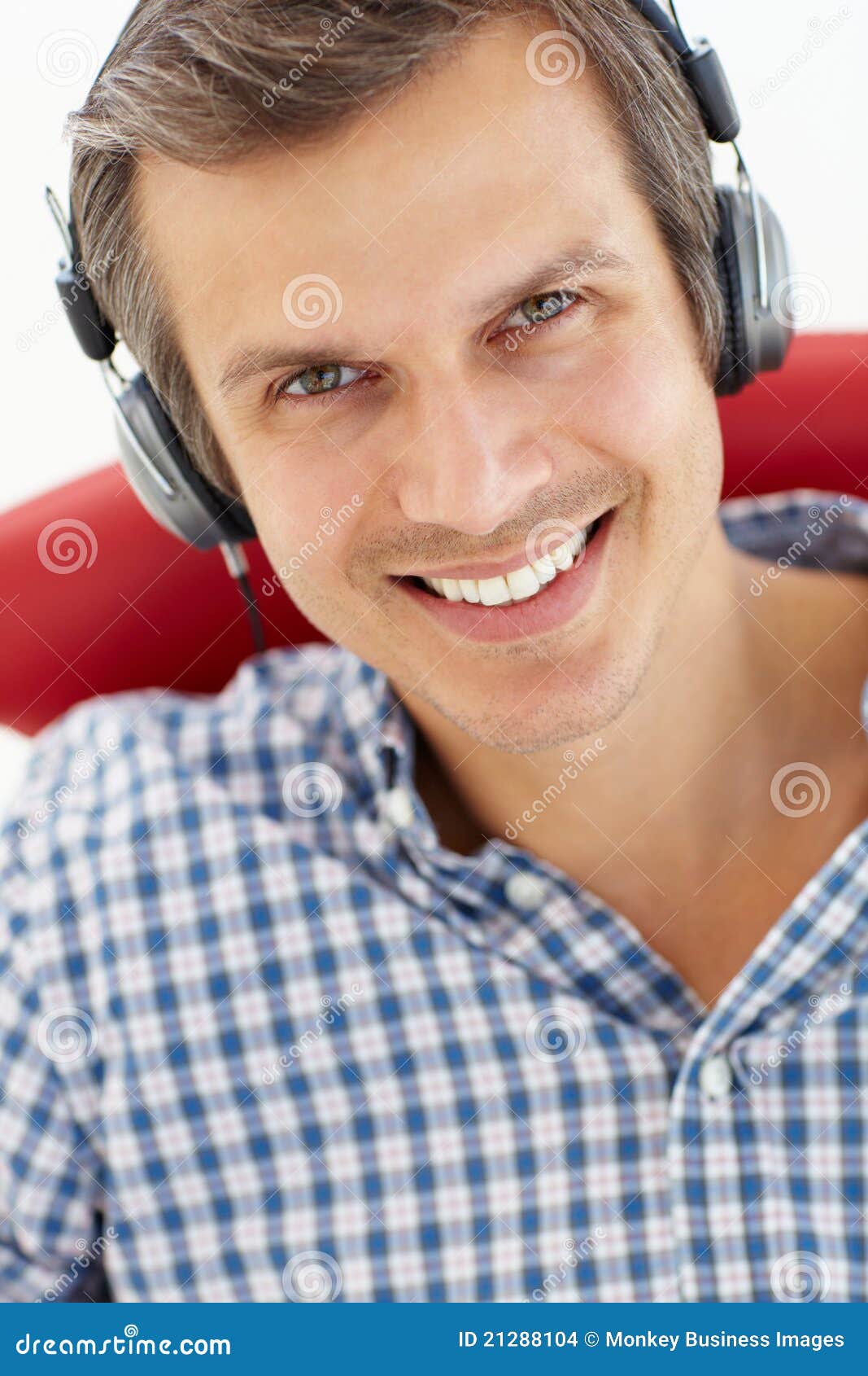 Man Listening with Headphones Stock Photo - Image of looking, listen ...