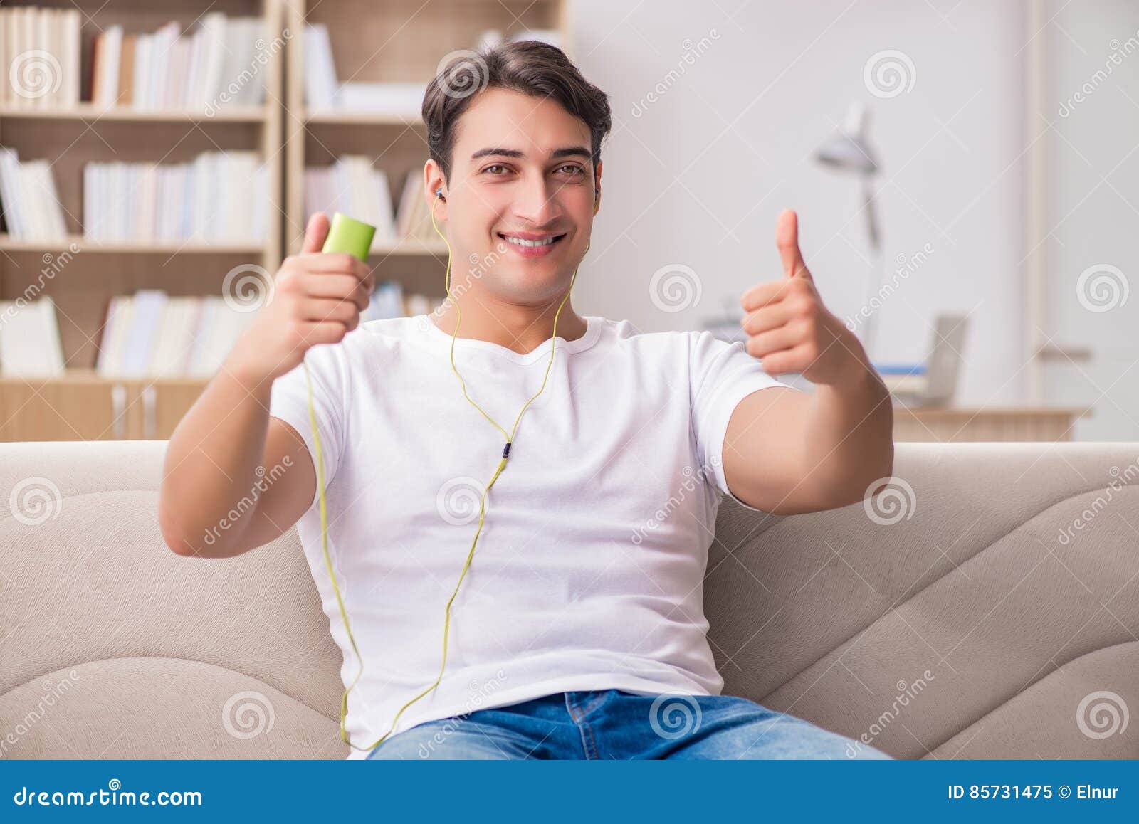 The Man Listening Music Sitting In Couch Stock Image Image Of