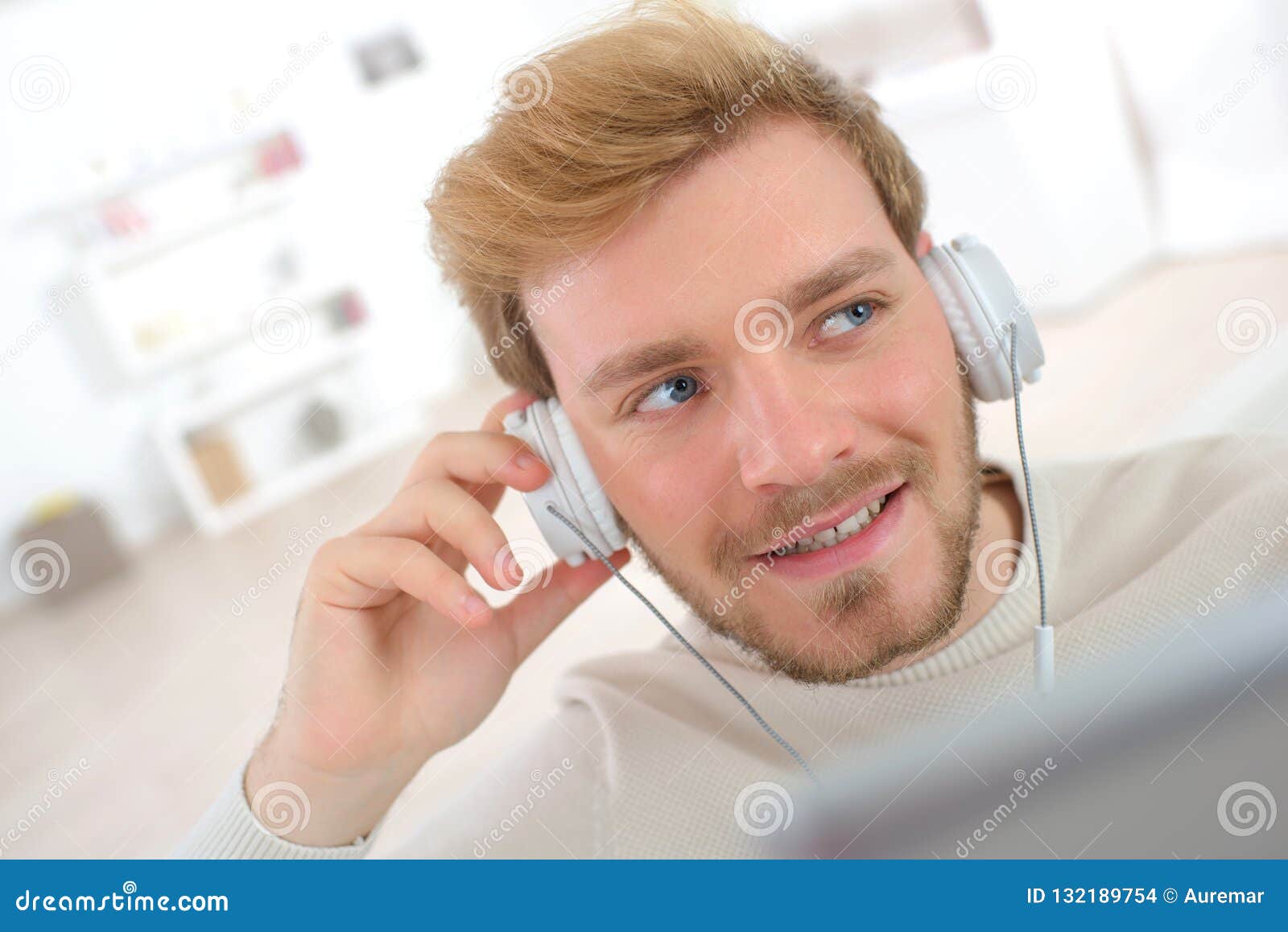 Man listening to music stock photo. Image of lounge - 132189754