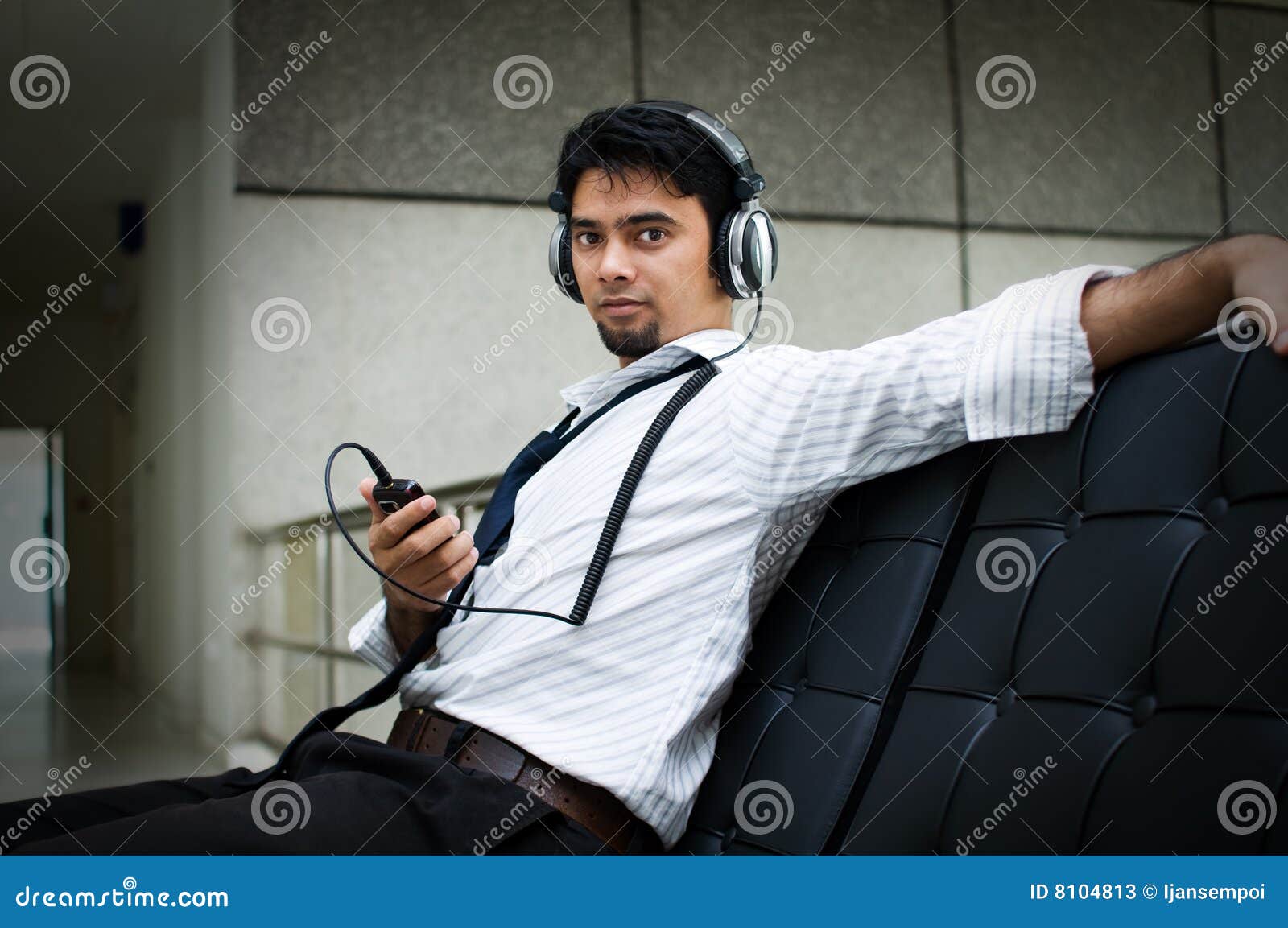 Man listening to music stock image. Image of chair, arabian - 8104813