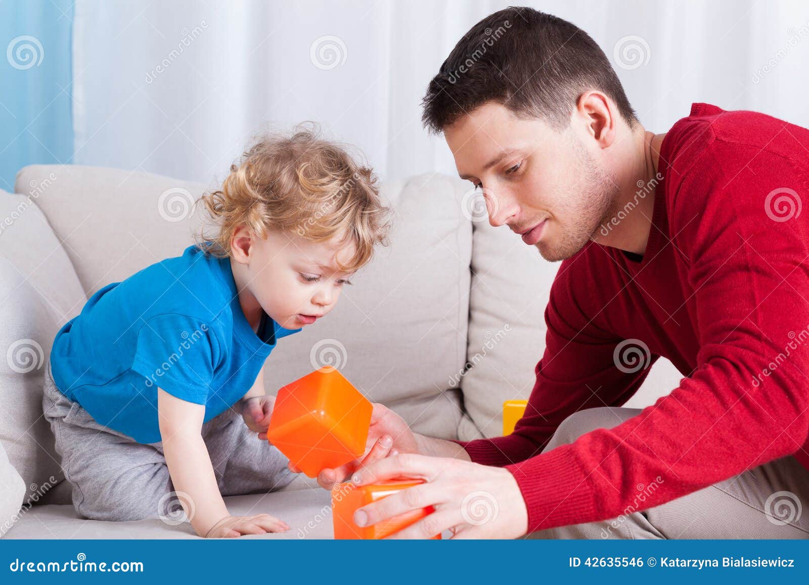 Man and Little Boy Playing with Toys Stock Photo - Image of people ...