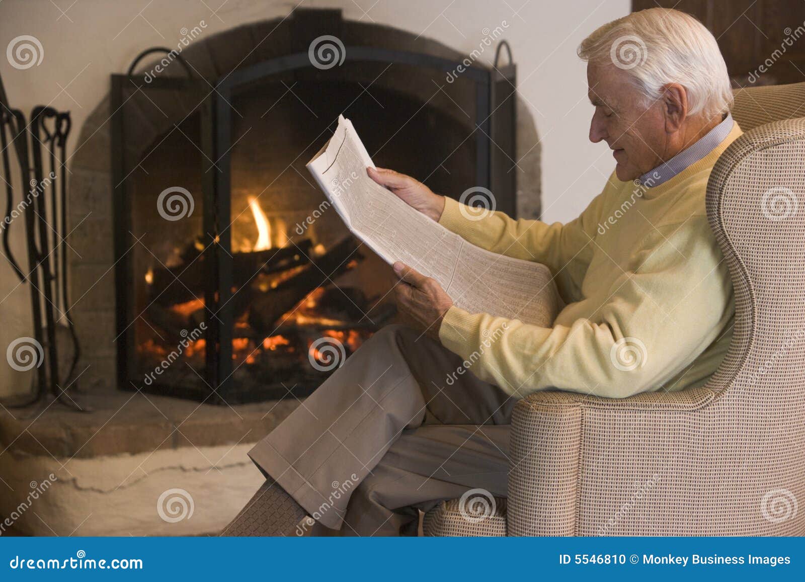 Man in Living Room Reading Newspaper Stock Photo - Image of cosy ...