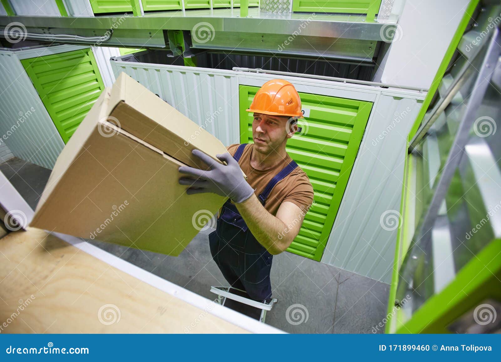 Man loading the boxes stock photo. Image of packaging - 171899460