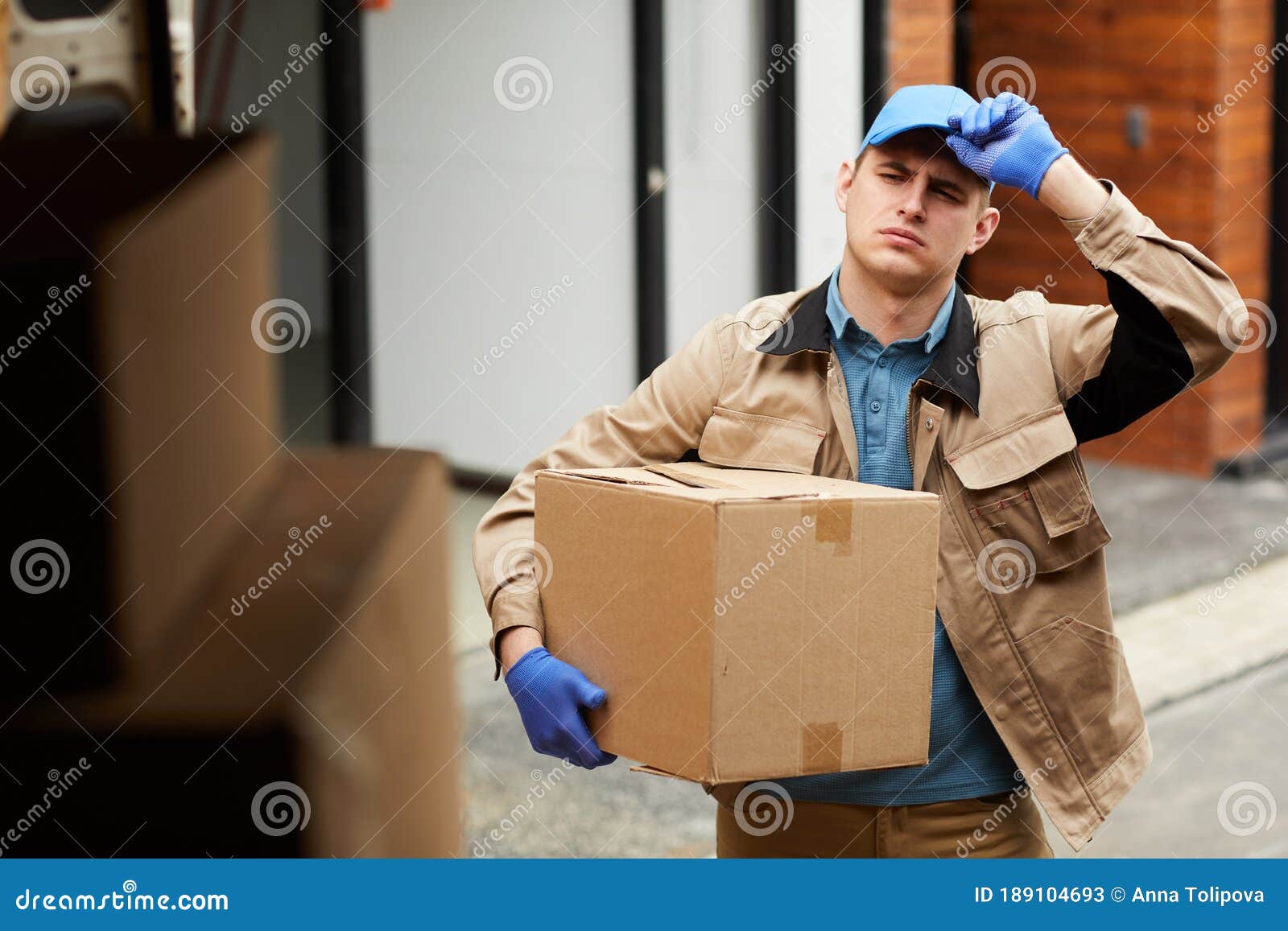 Man loading boxes stock image. Image of indoors, mail - 189104693
