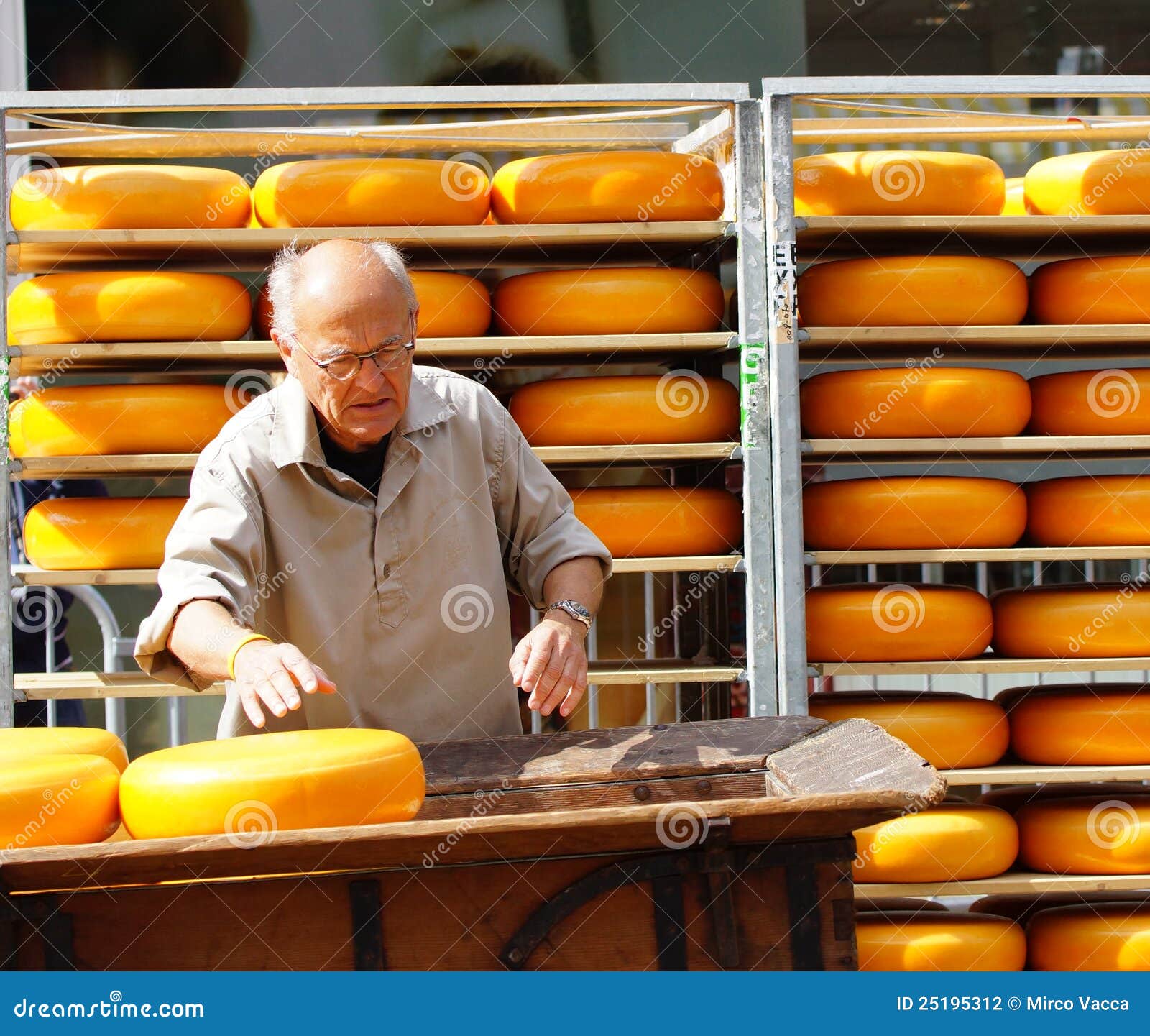 A Man Loading Cheese in a Container Editorial Photography - Image of ...