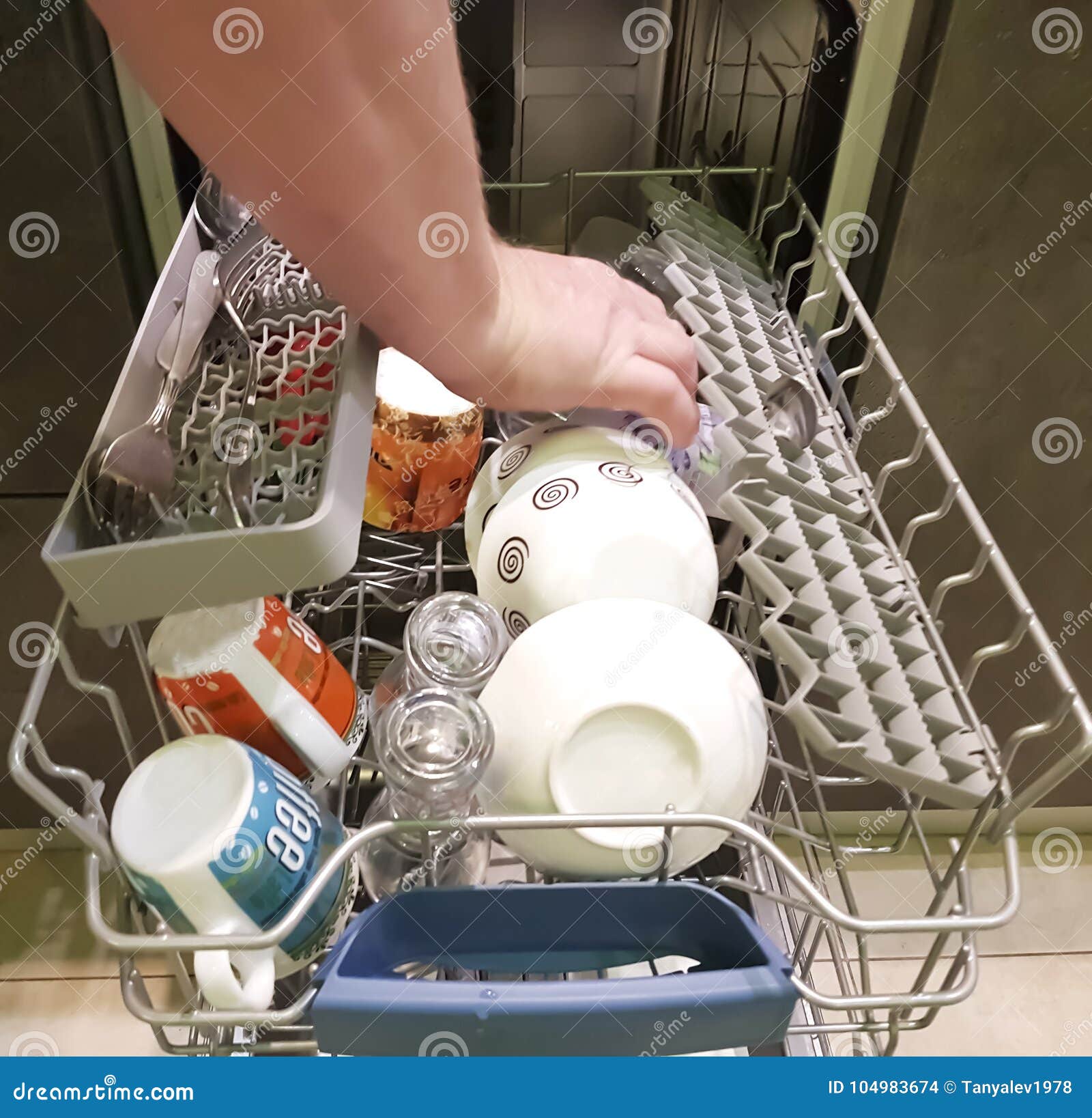 Man is Loading Dishes in the Dishwasher Stock Photo - Image of machine ...