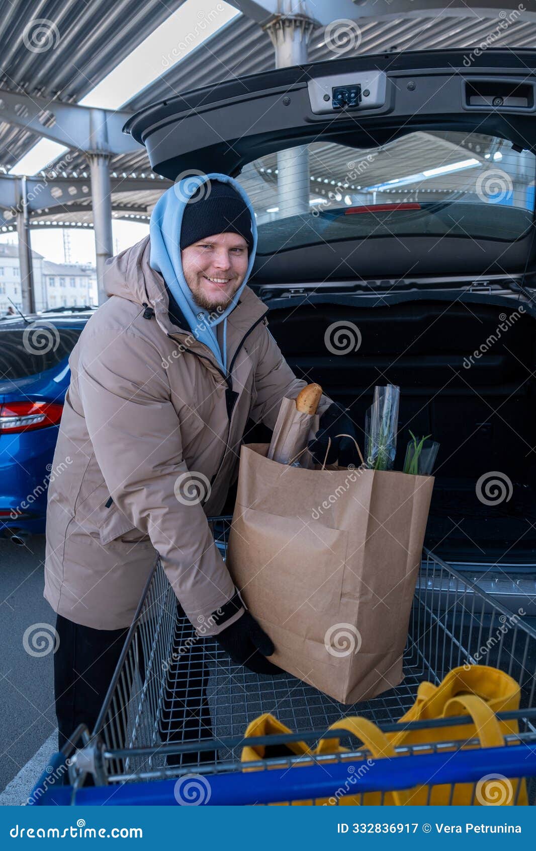 Man Loading Groceries into Car Trunk Stock Image - Image of vehicles ...