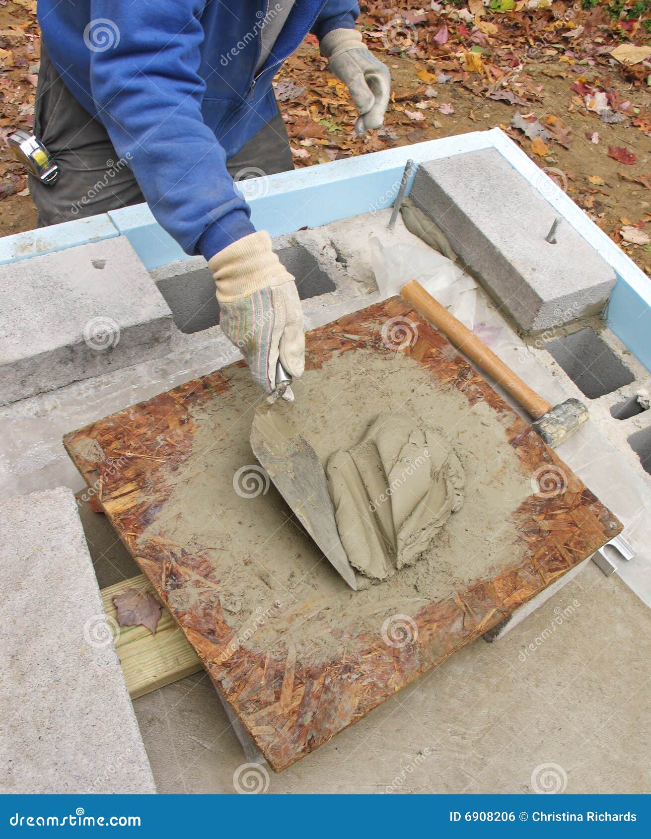 Man Loading Trowel with Mortar Stock Photo - Image of glove, foundation ...
