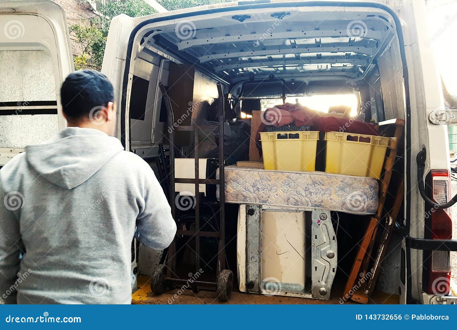 Man loading a van stock photo. Image of adult, male - 143732656