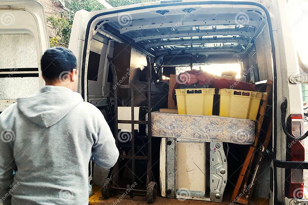 Man loading a van stock photo. Image of adult, male - 143732656