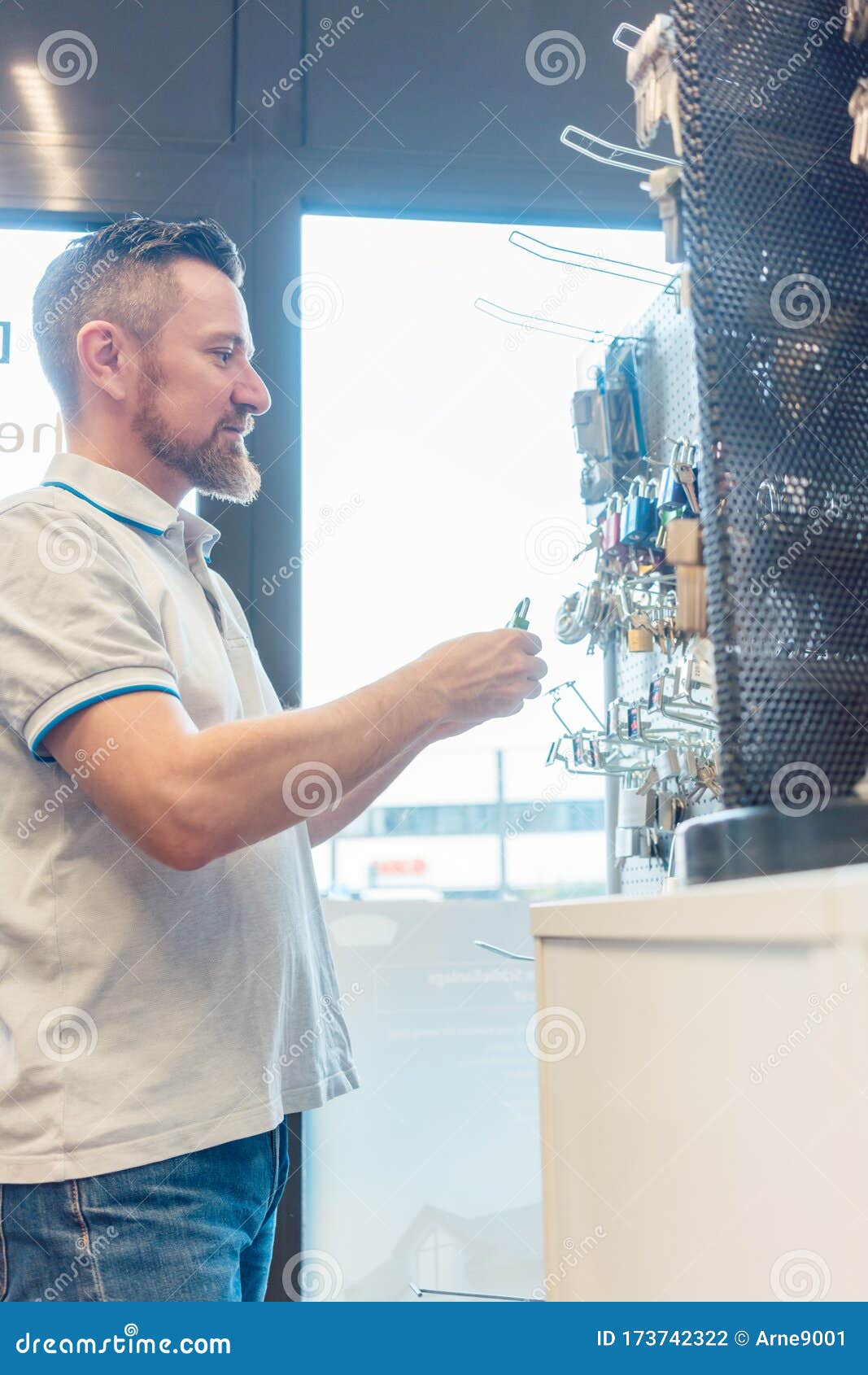 Man Locksmith Choosing Key Blank Stock Photo - Image of male, shop ...
