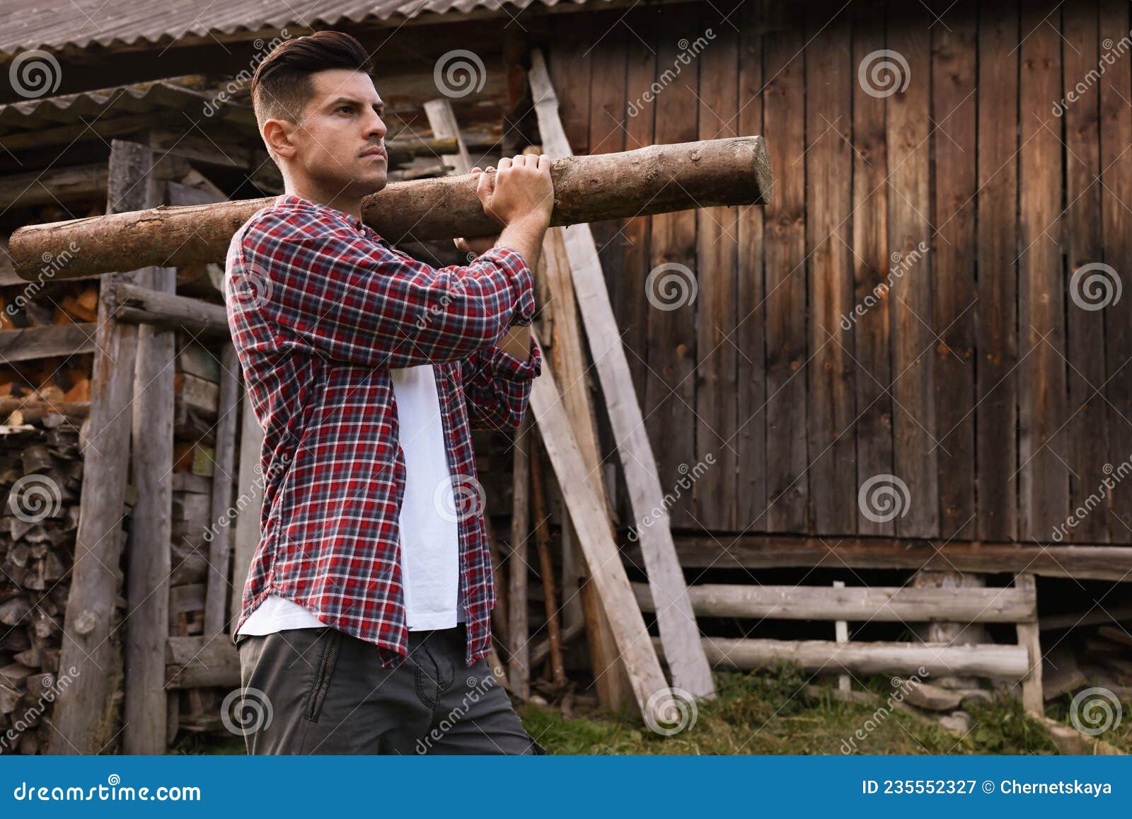 Man with Log Near Wood Pile Outdoors Stock Image - Image of handsome ...