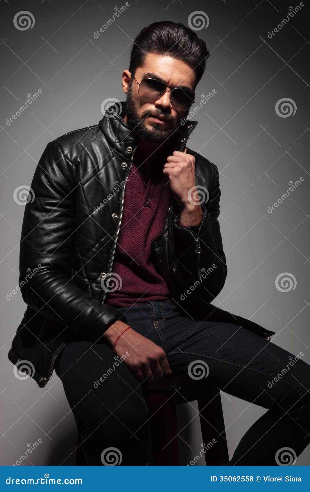 Man with Long Beard is Pulling His Leather Jacket S Collar Stock Photo ...