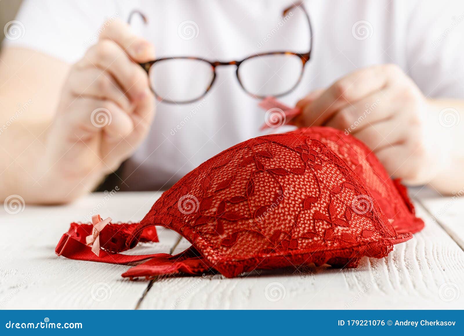 Man Look at the Size on the Label of Bra Stock Photo - Image of boobs ...