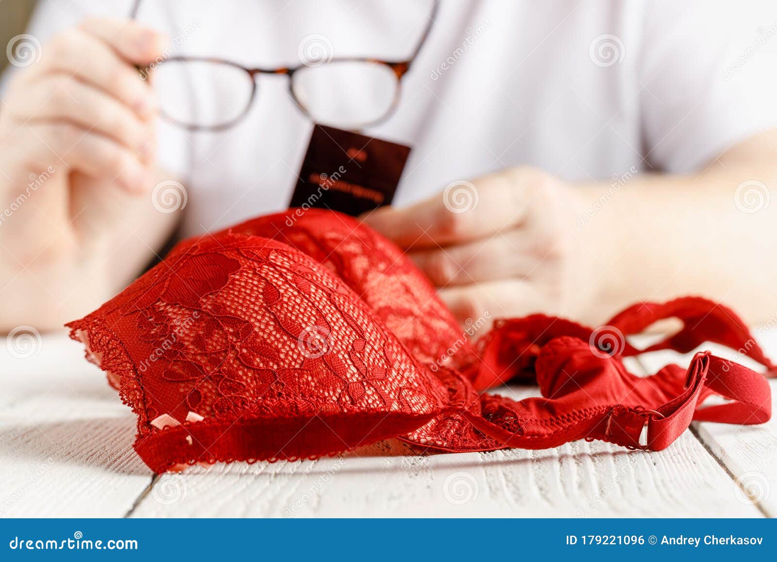 Man Look at the Size on the Label of Bra Stock Photo - Image of ...