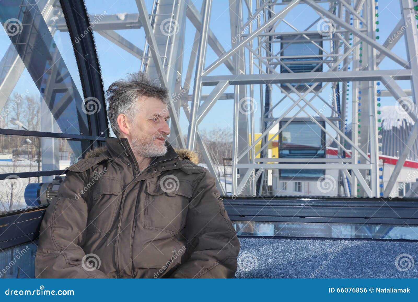 The Man Looking Afar from a Ferris Wheel Cabin Stock Photo - Image of ...