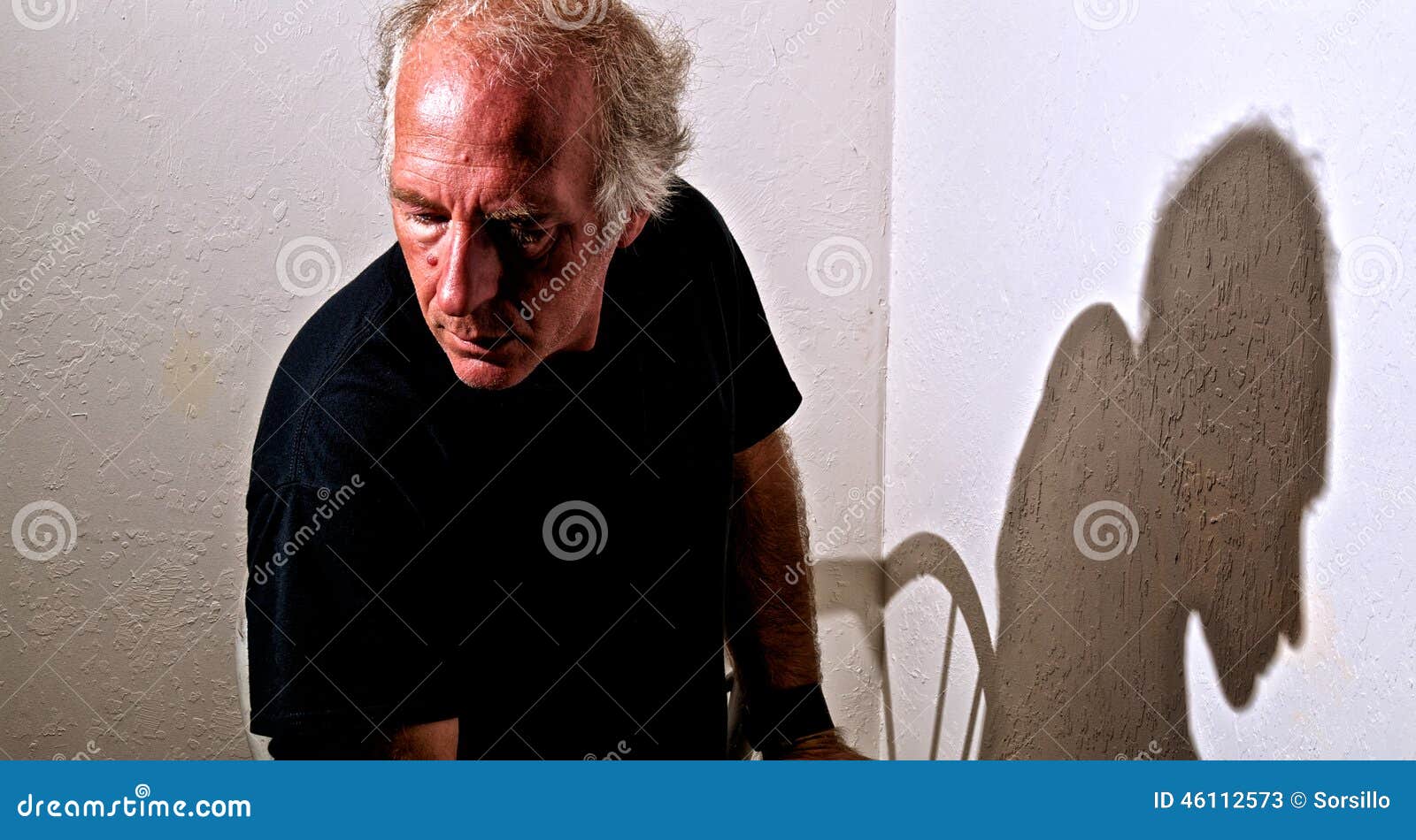 Man Looking Away with Shadow Stock Image - Image of white, wall: 46112573