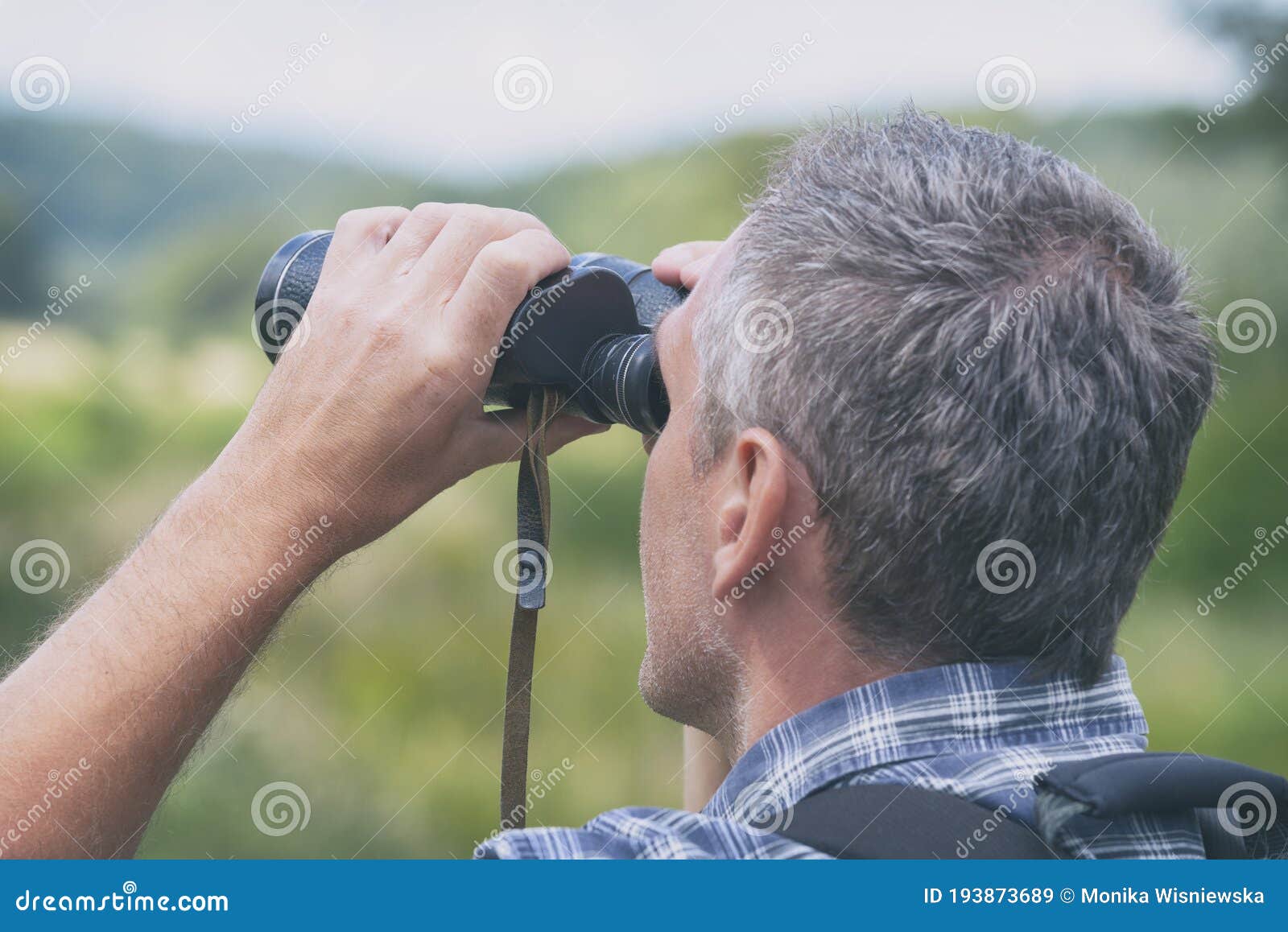 Man Looking through Binocular Stock Image - Image of portrait ...