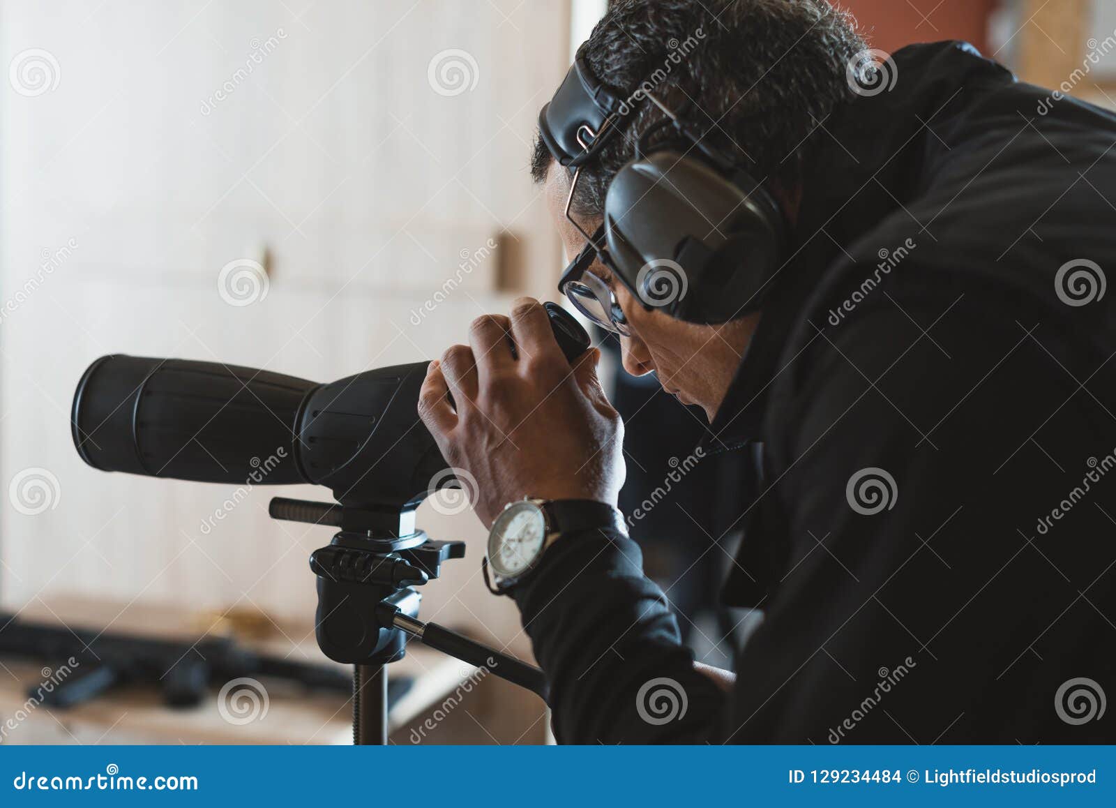 Man Looking through Binoculars Stock Photo - Image of selectivefocus ...